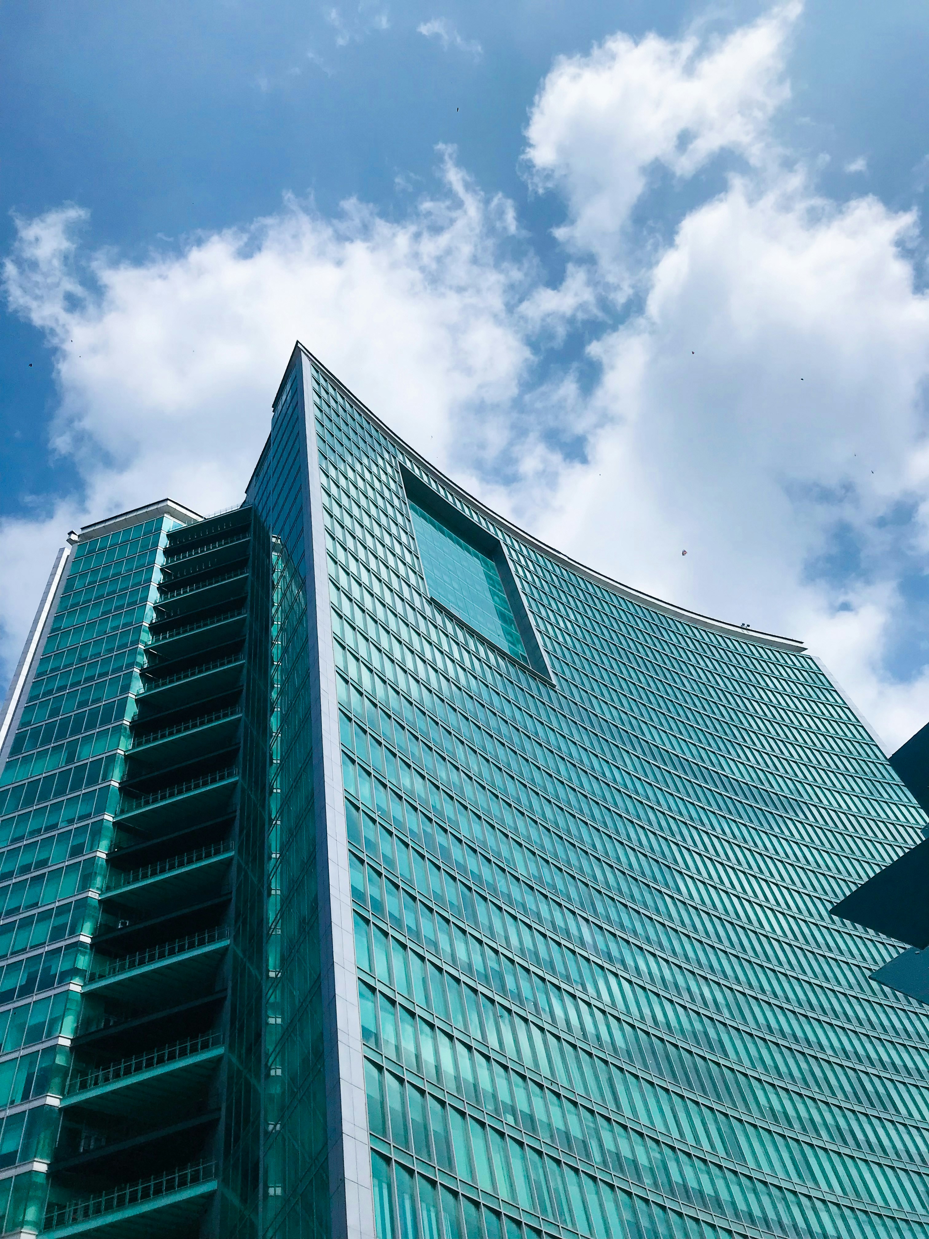 High Ultra Lounge  | a very tall building with a sky background