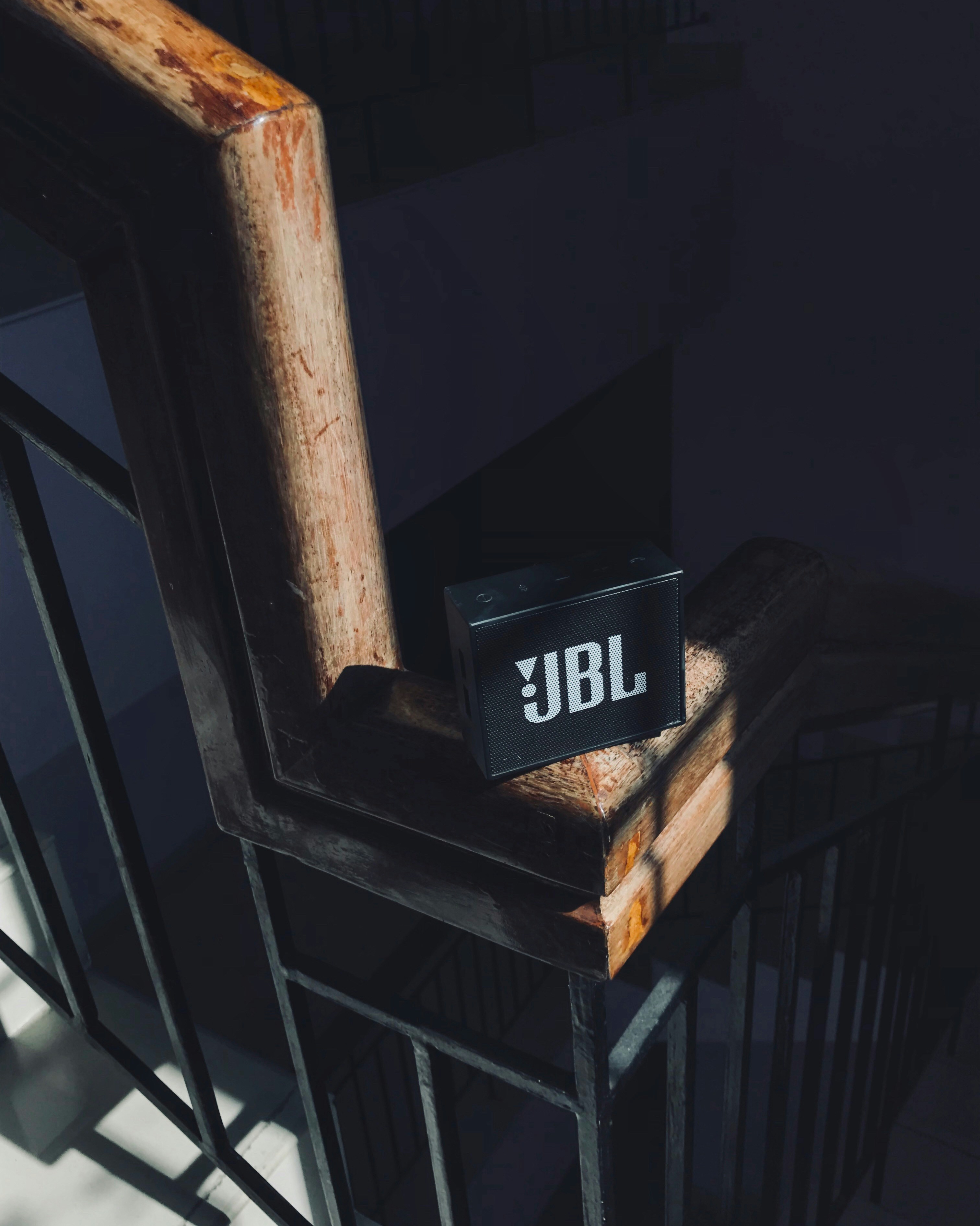 a wooden chair with a black label on it