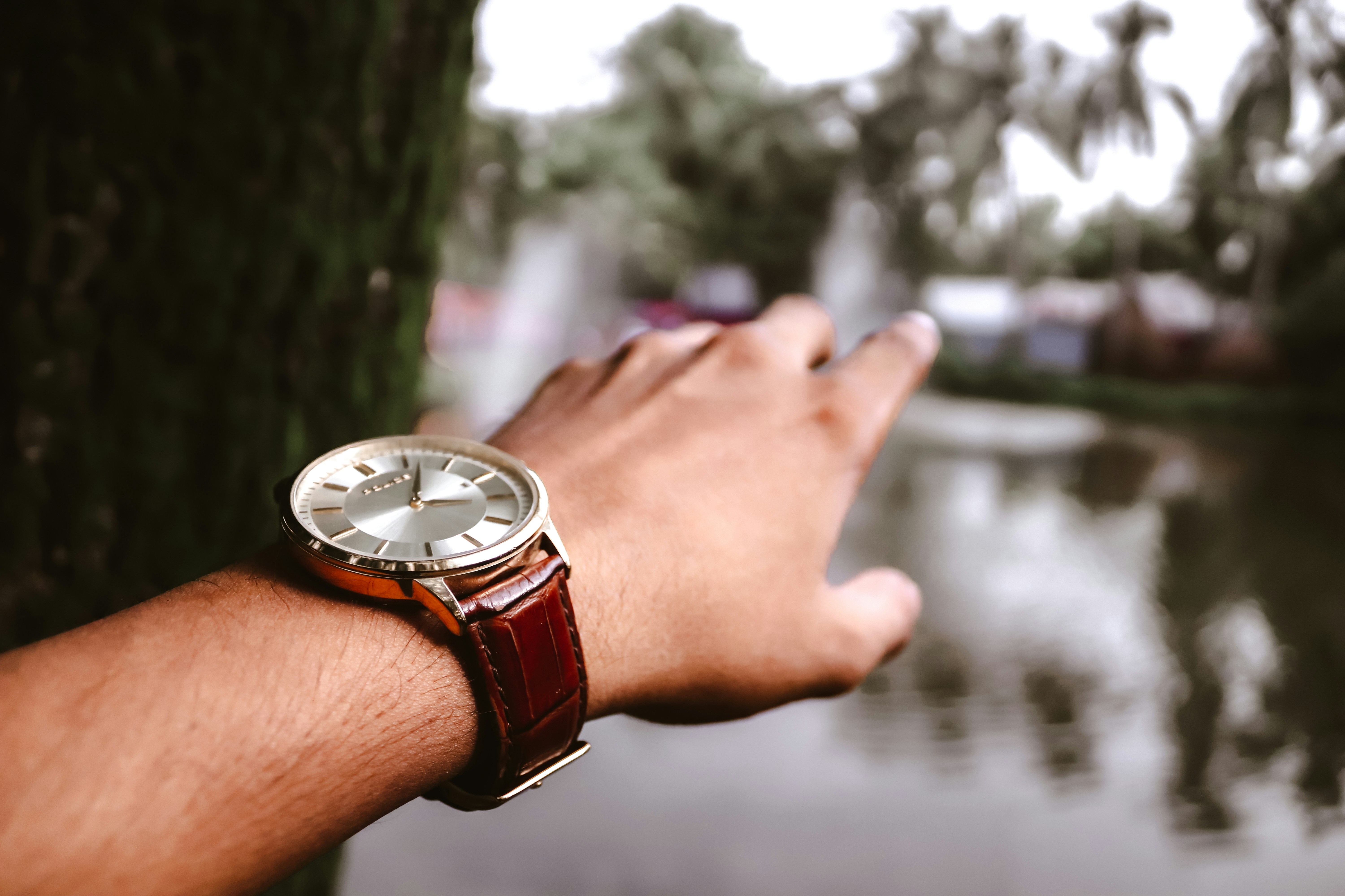 a person's wrist with a watch on it