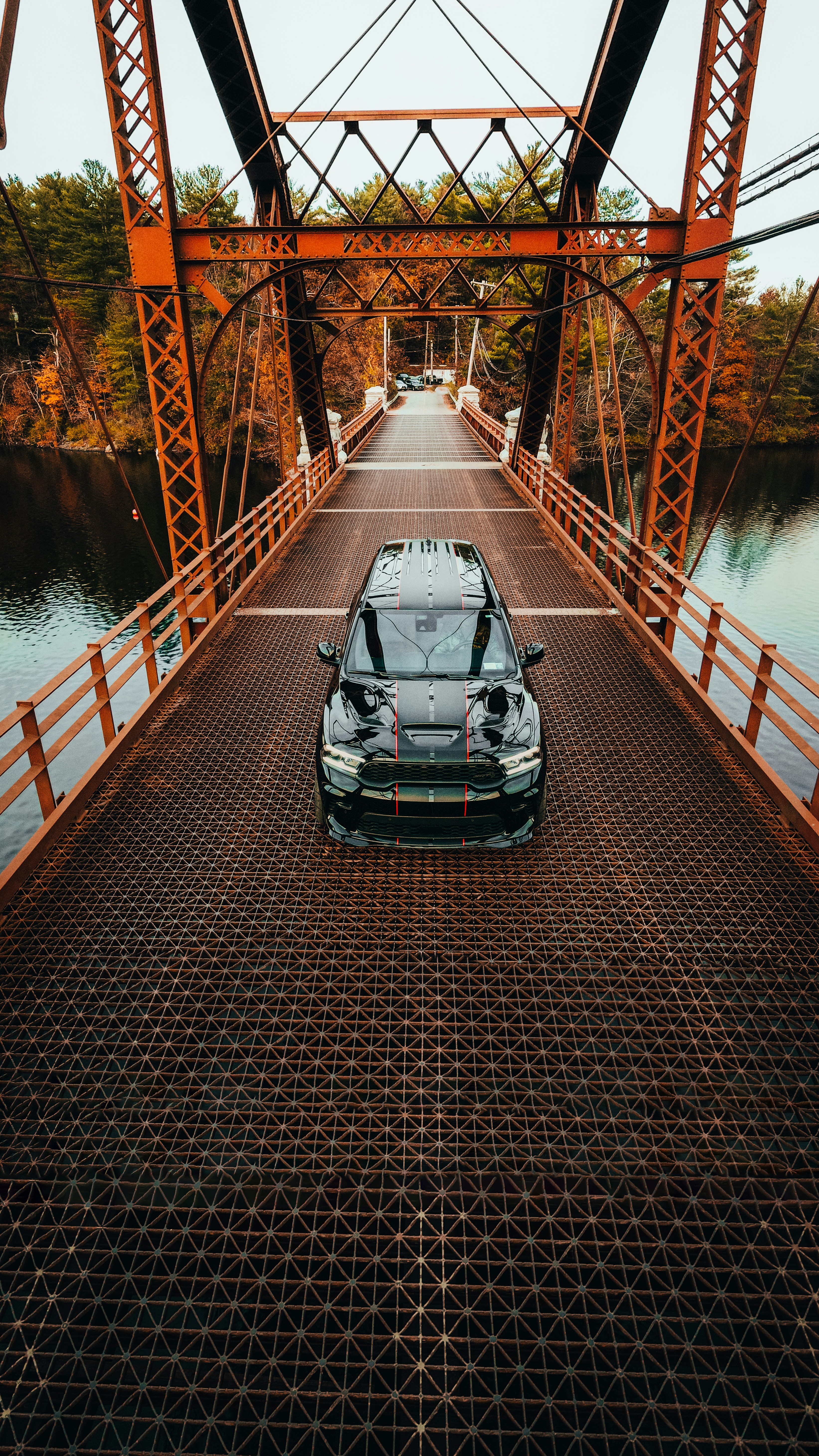 Centered Power Crossing: A Sportscar on a Rusted Span