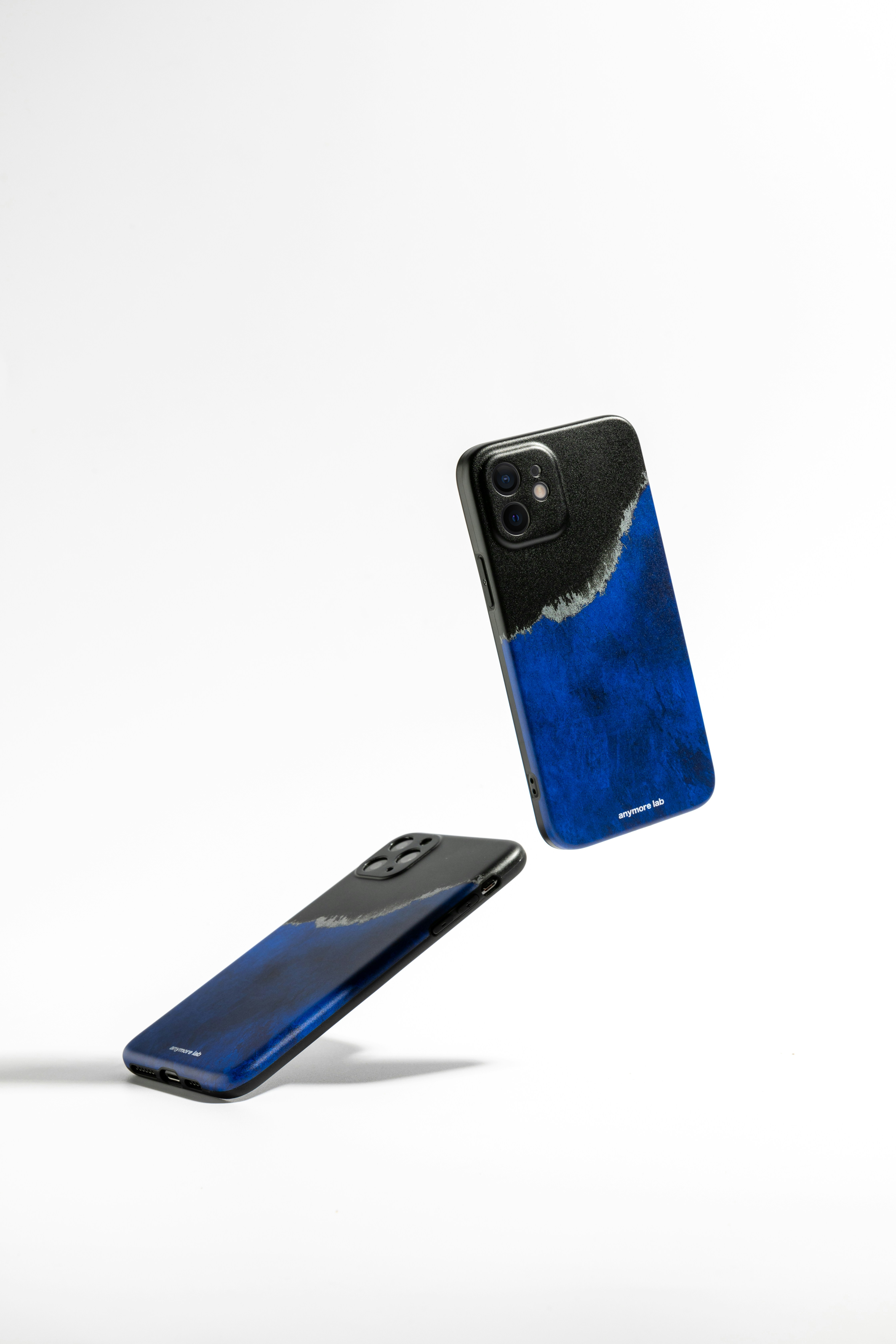 A cell phone flying through the air next to a cell phone photo – Free ...