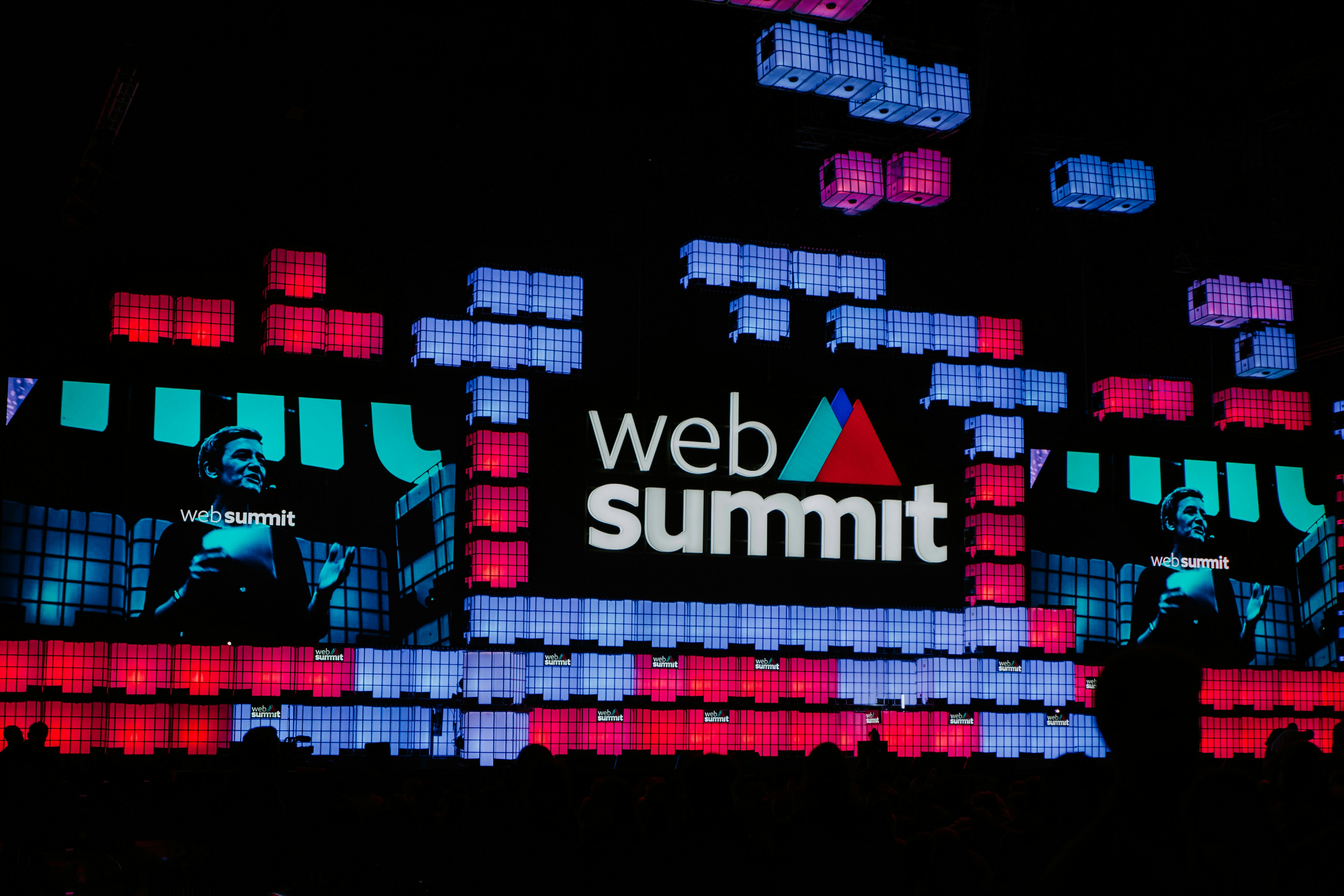 A large screen with a web summit logo on it photo – Free Lisbon Image ...