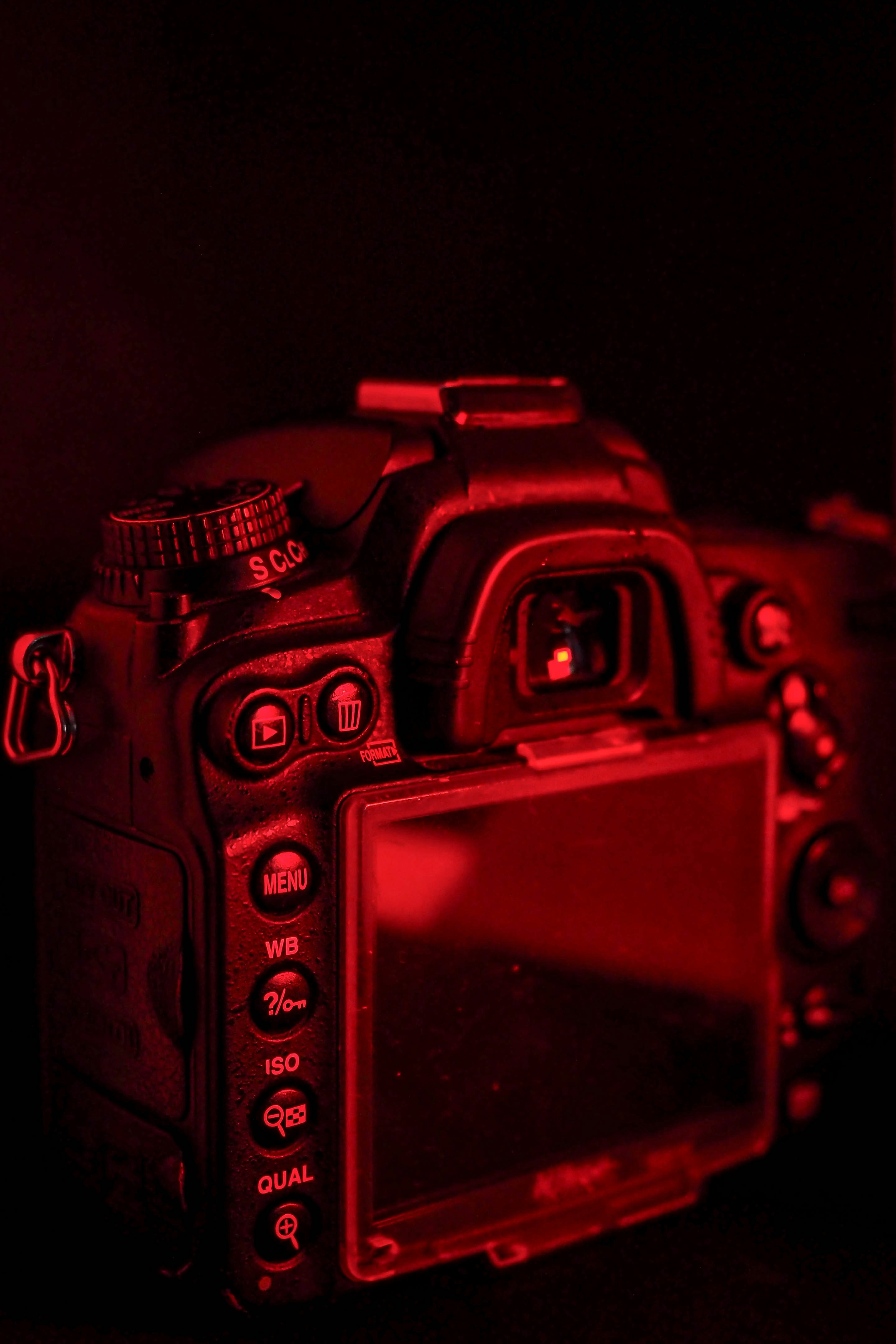 A camera with a red light shining on it photo – Free Nikon Image on ...