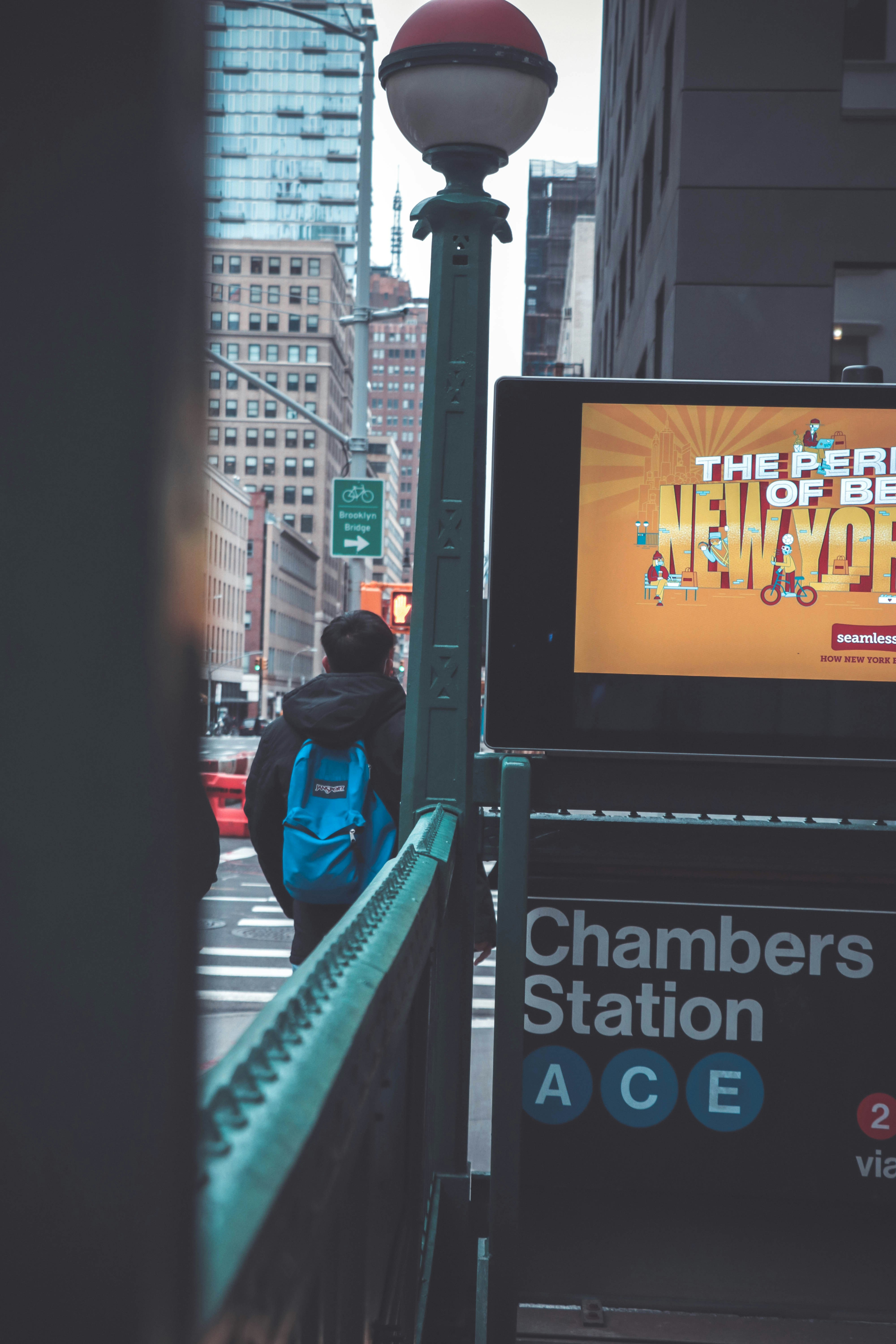 Green Streetlamp at a NYC Street Corner Framed by a Bold Billboard