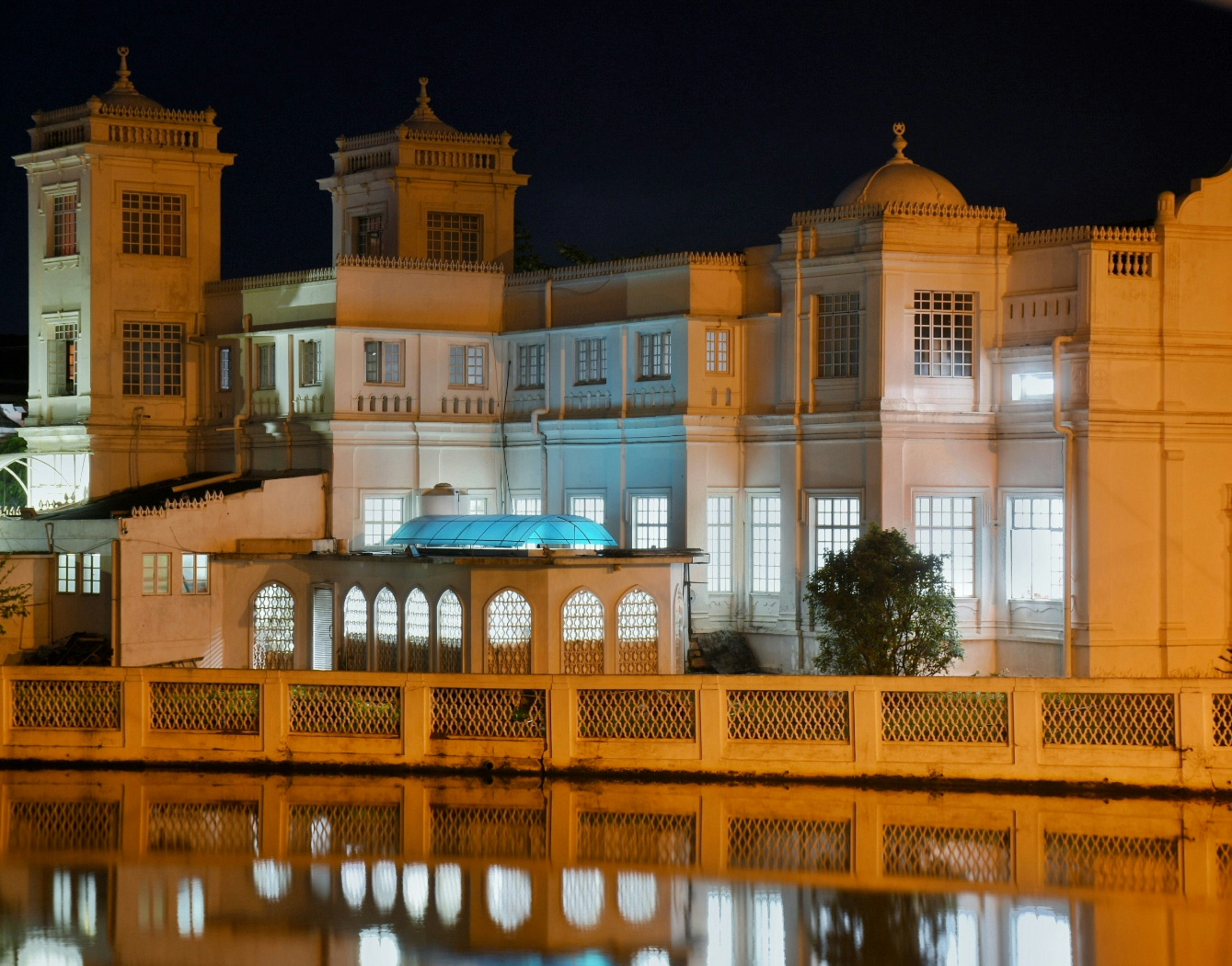 Midnight Canopy Over Amber Facades