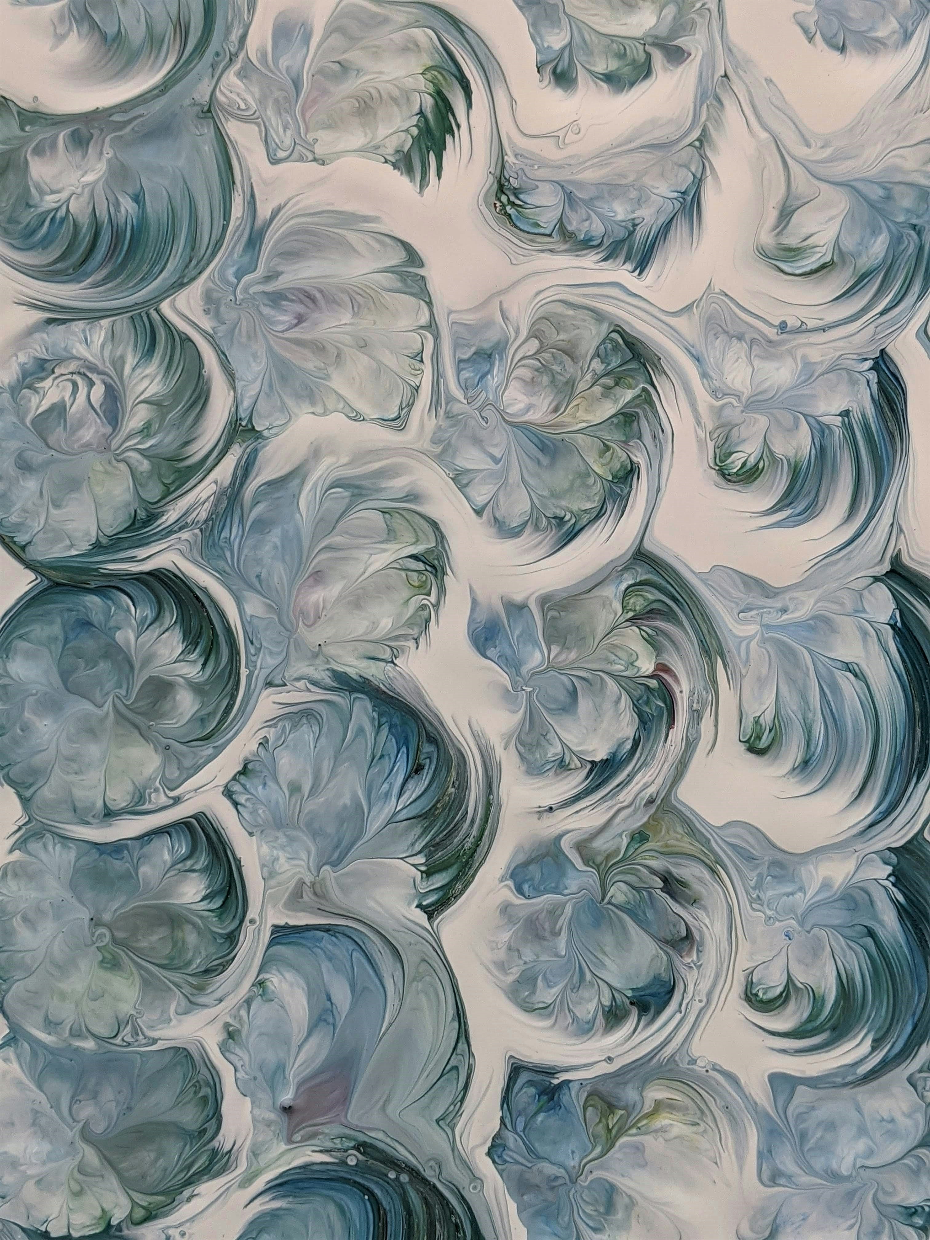 an abstract painting of blue and white colors