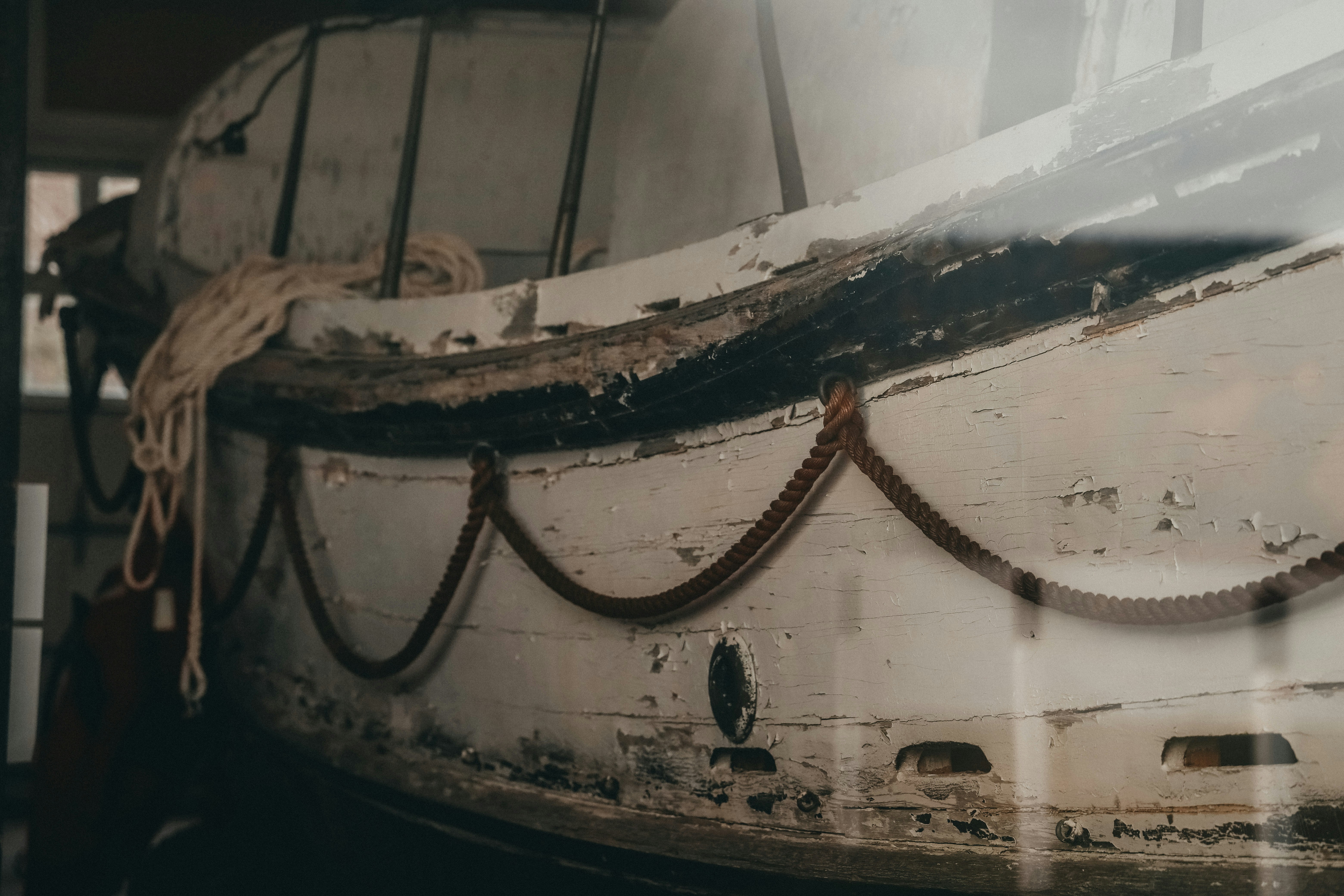 A close up of an old boat with rope on it photo – Free Wood Image on ...