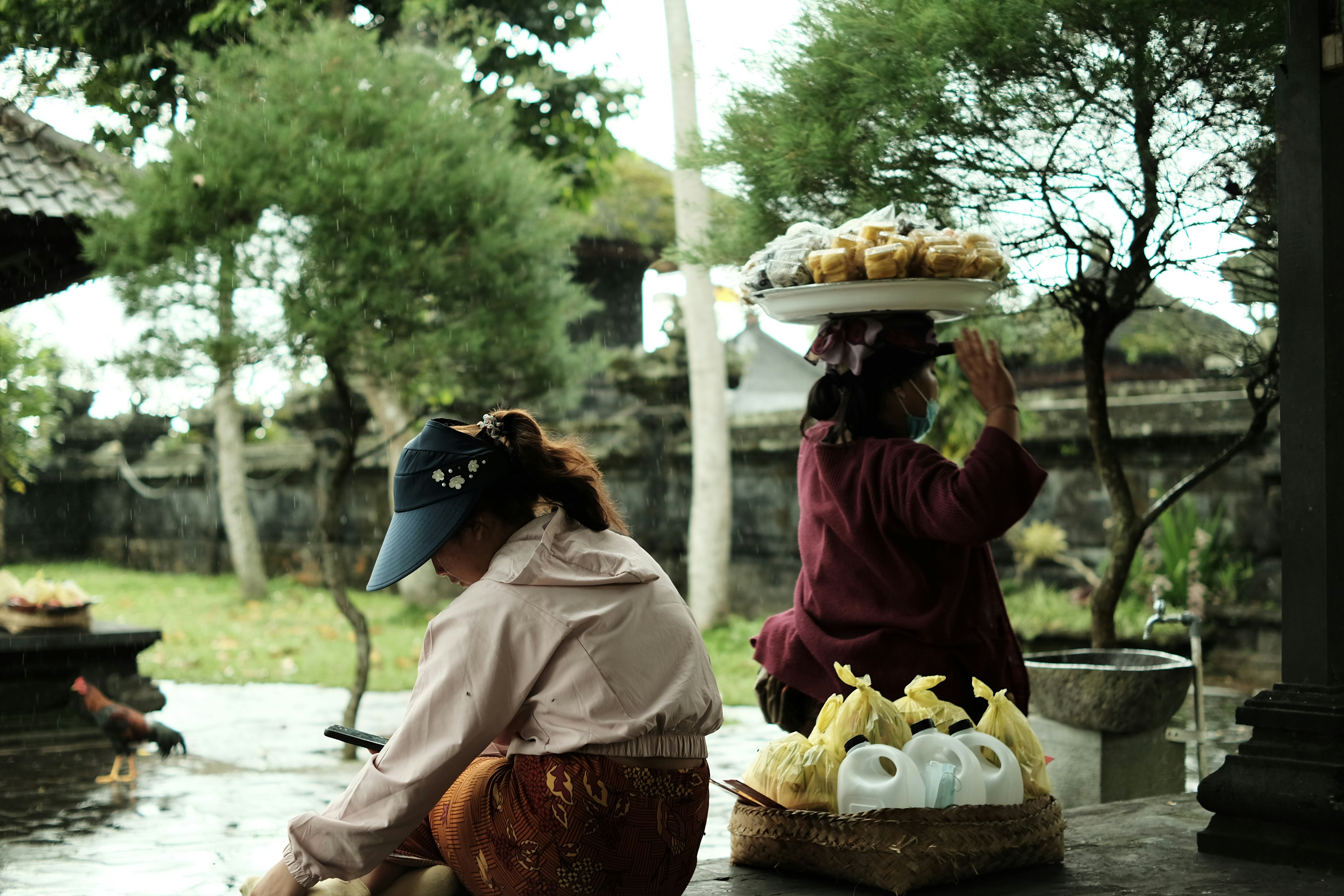 Balancing Offerings in a Temple Courtyard