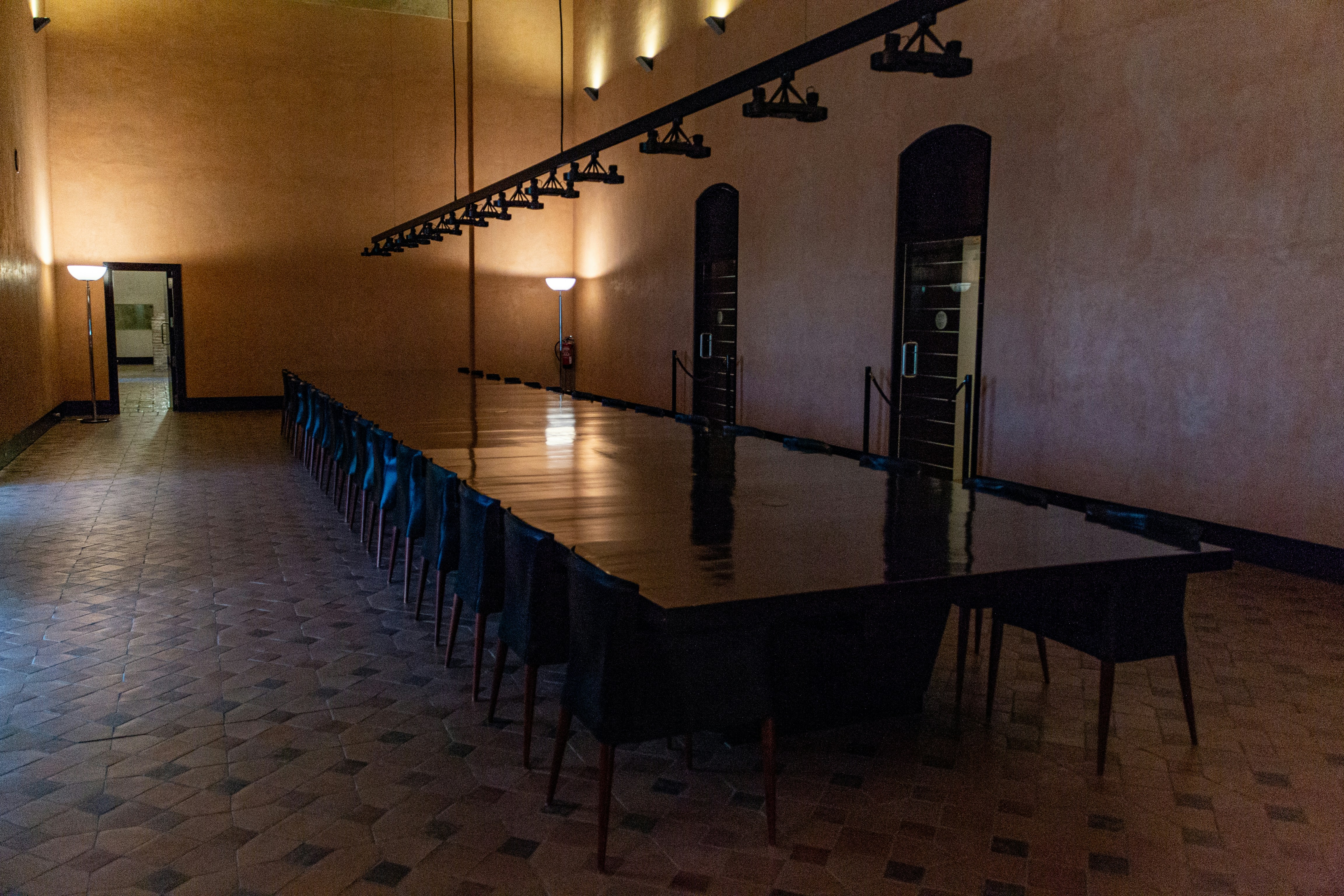 Symmetrical Silence: The Endless Dining Table