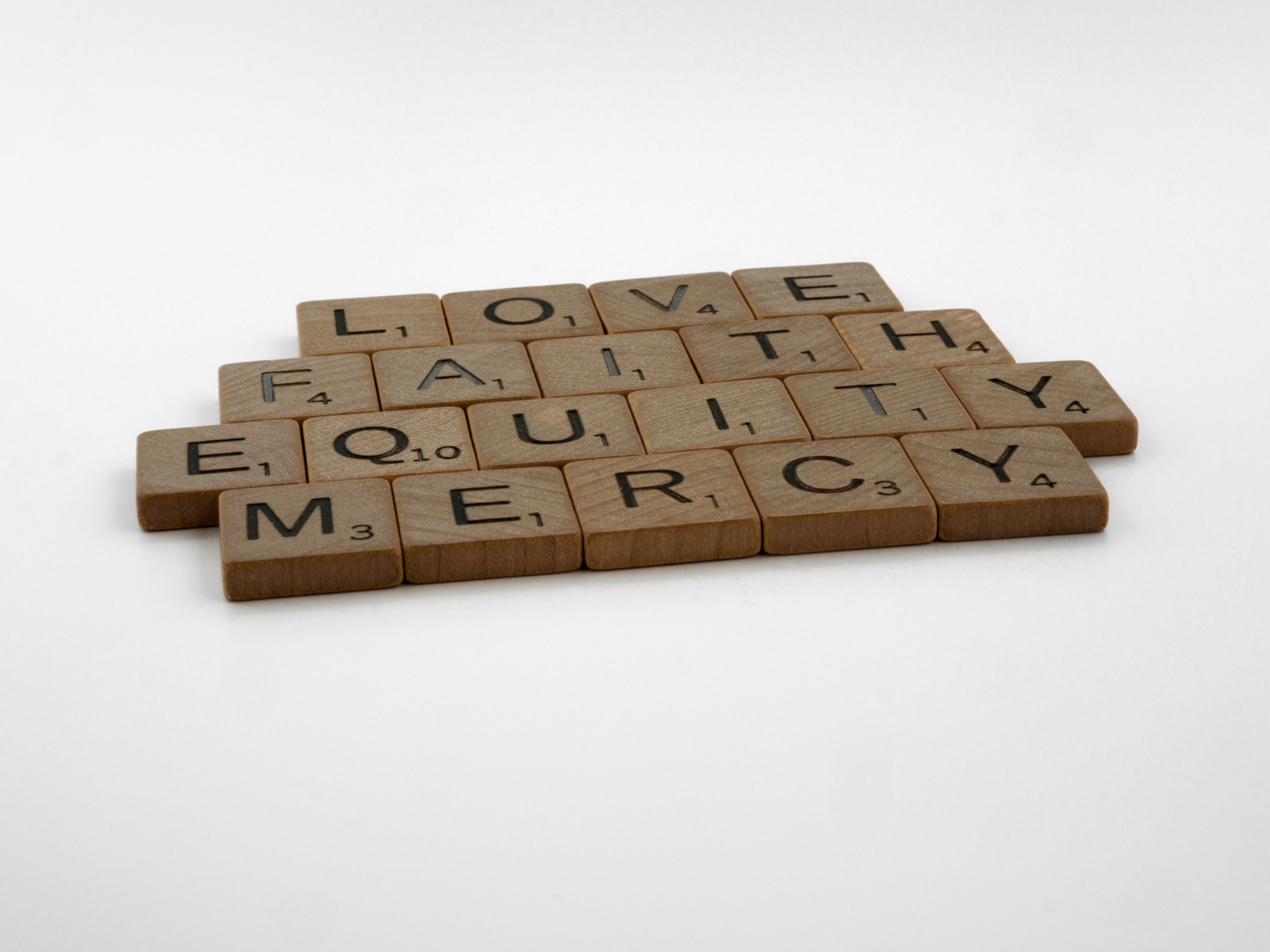 Scrabble tiles spelling love, faith, and liberty photo – Free Grey ...