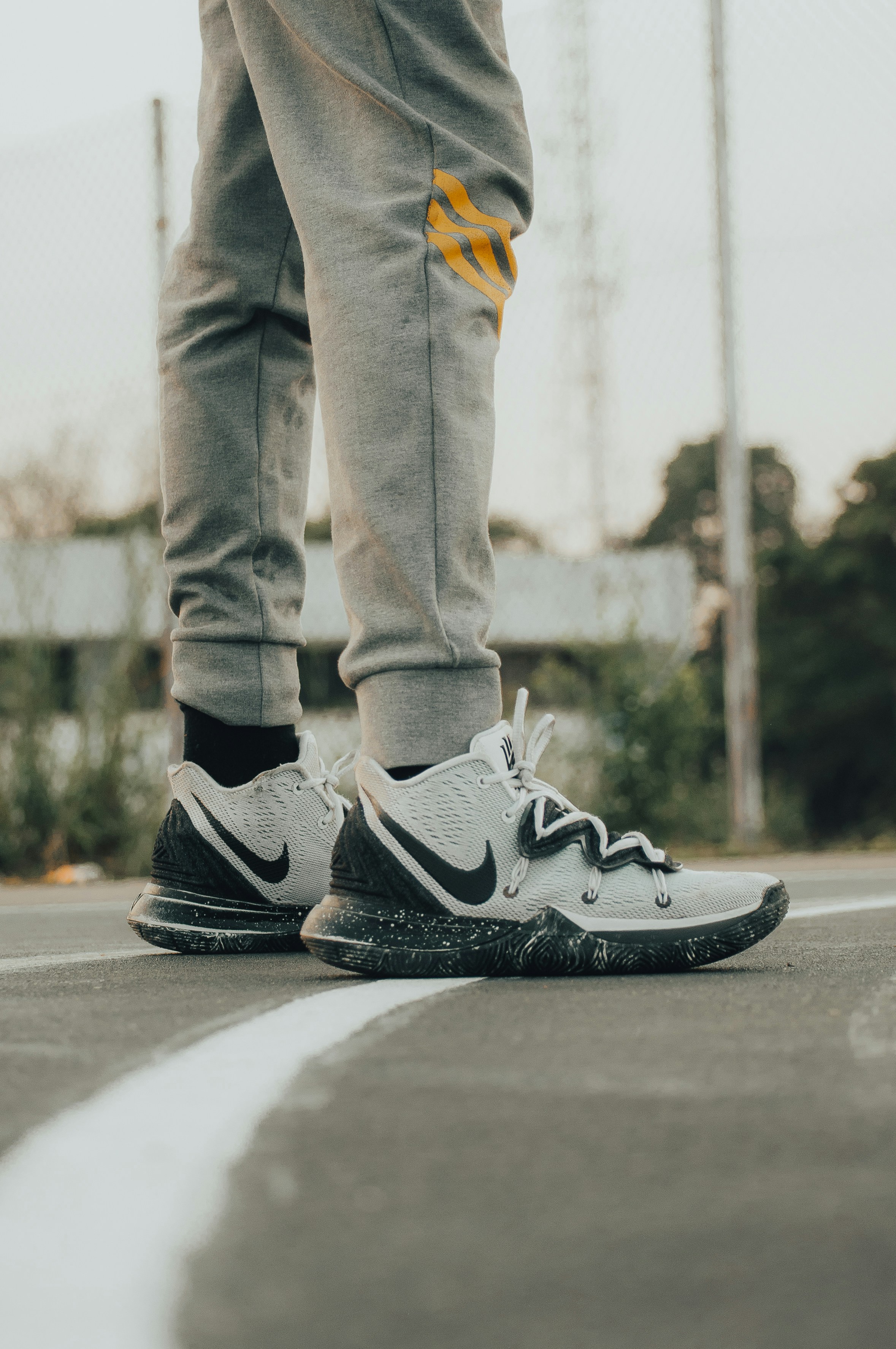 Lineside Pause: Nike Sneakers Ground a Painted Road