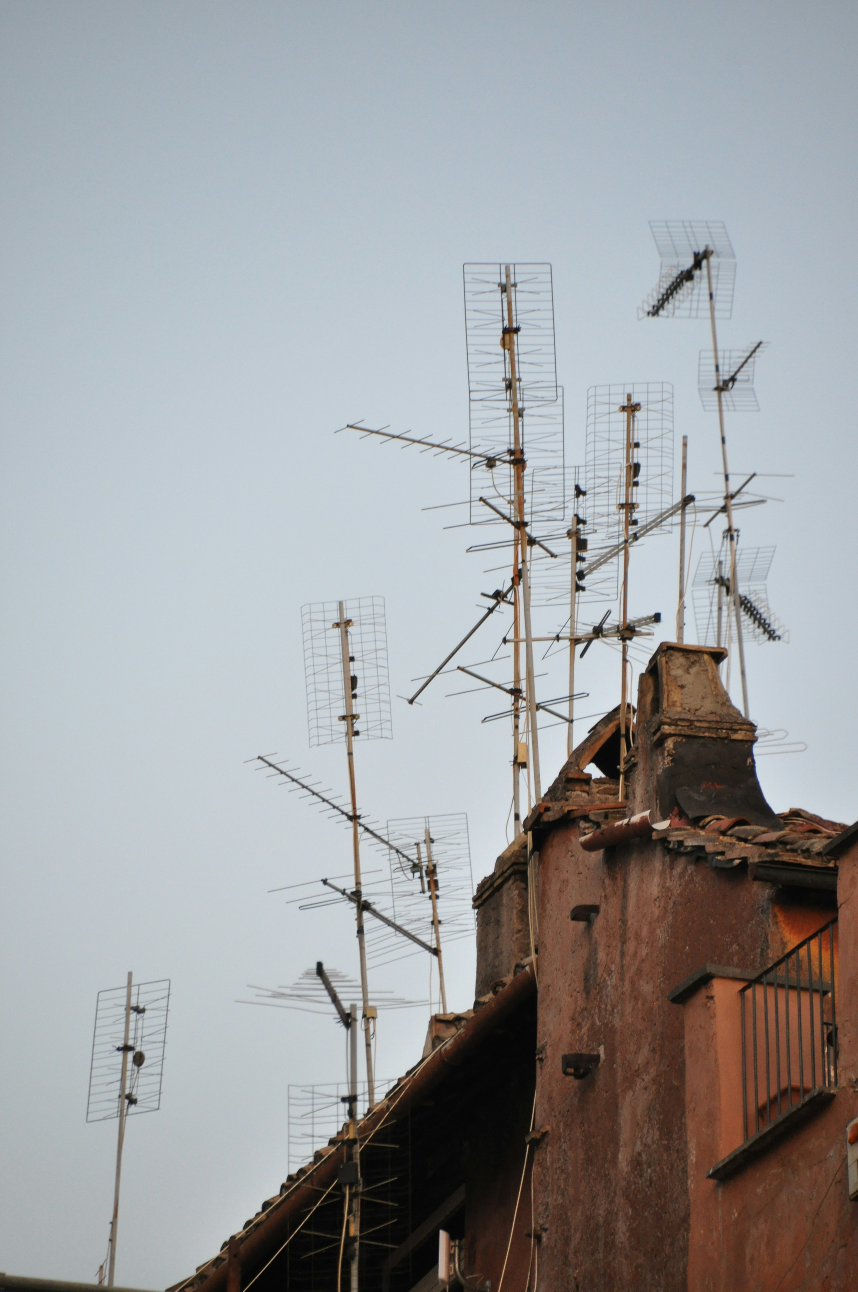 Rooftop Antenna Orchestra Rising Against a Pale Sky