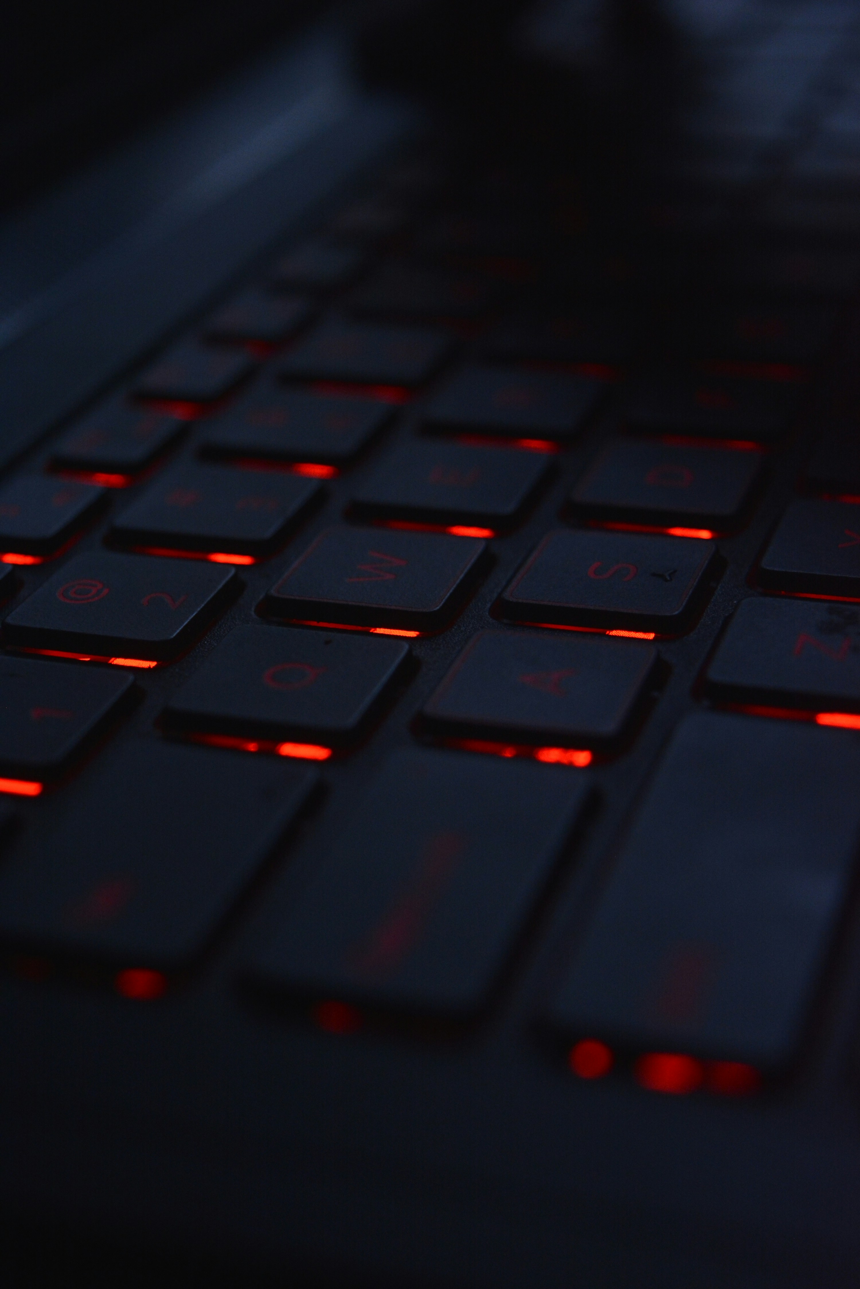 A close up of a computer keyboard with red keys photo – Free Computer ...