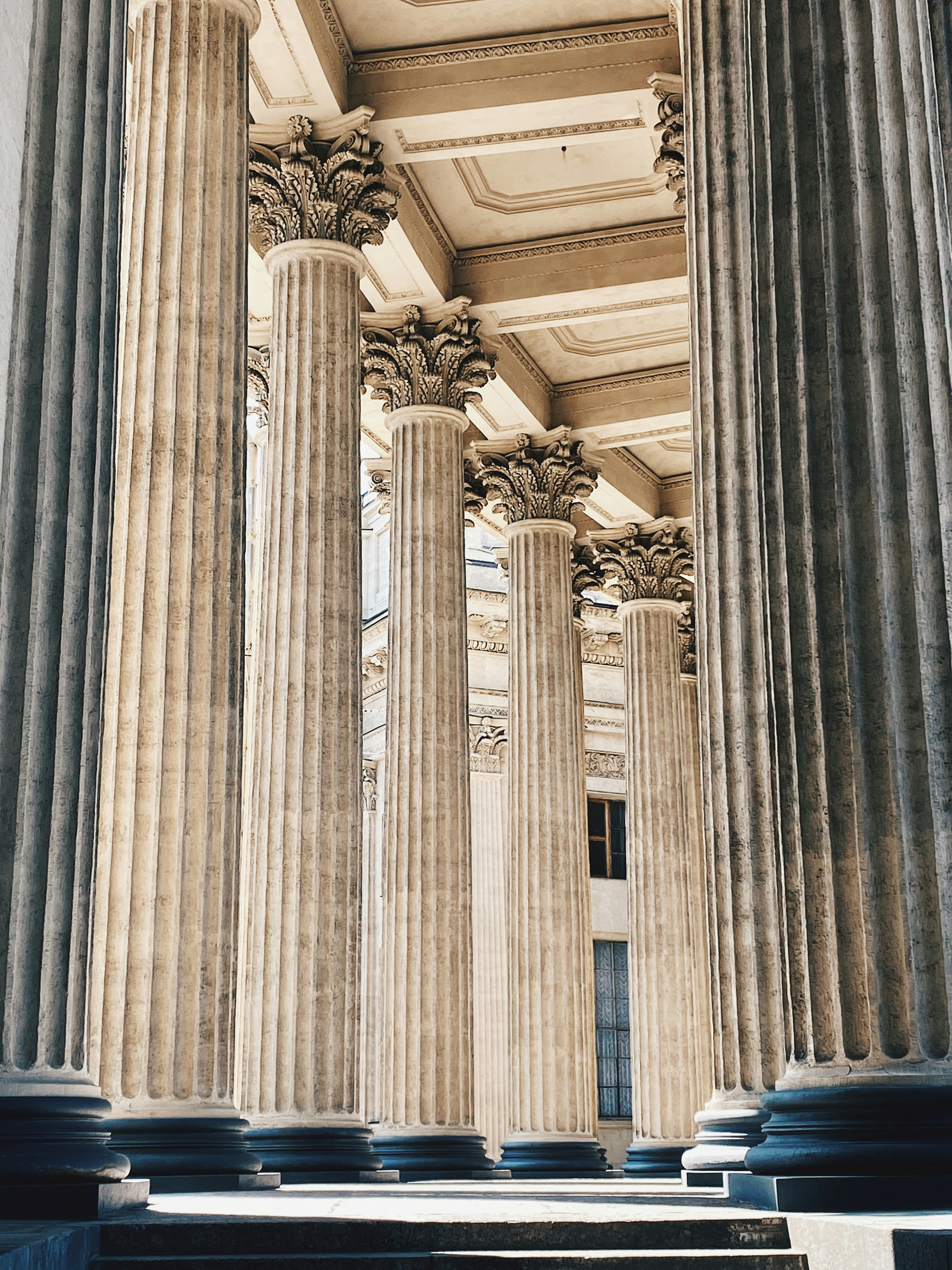 The columns of a building are lined with columns photo – Free ...