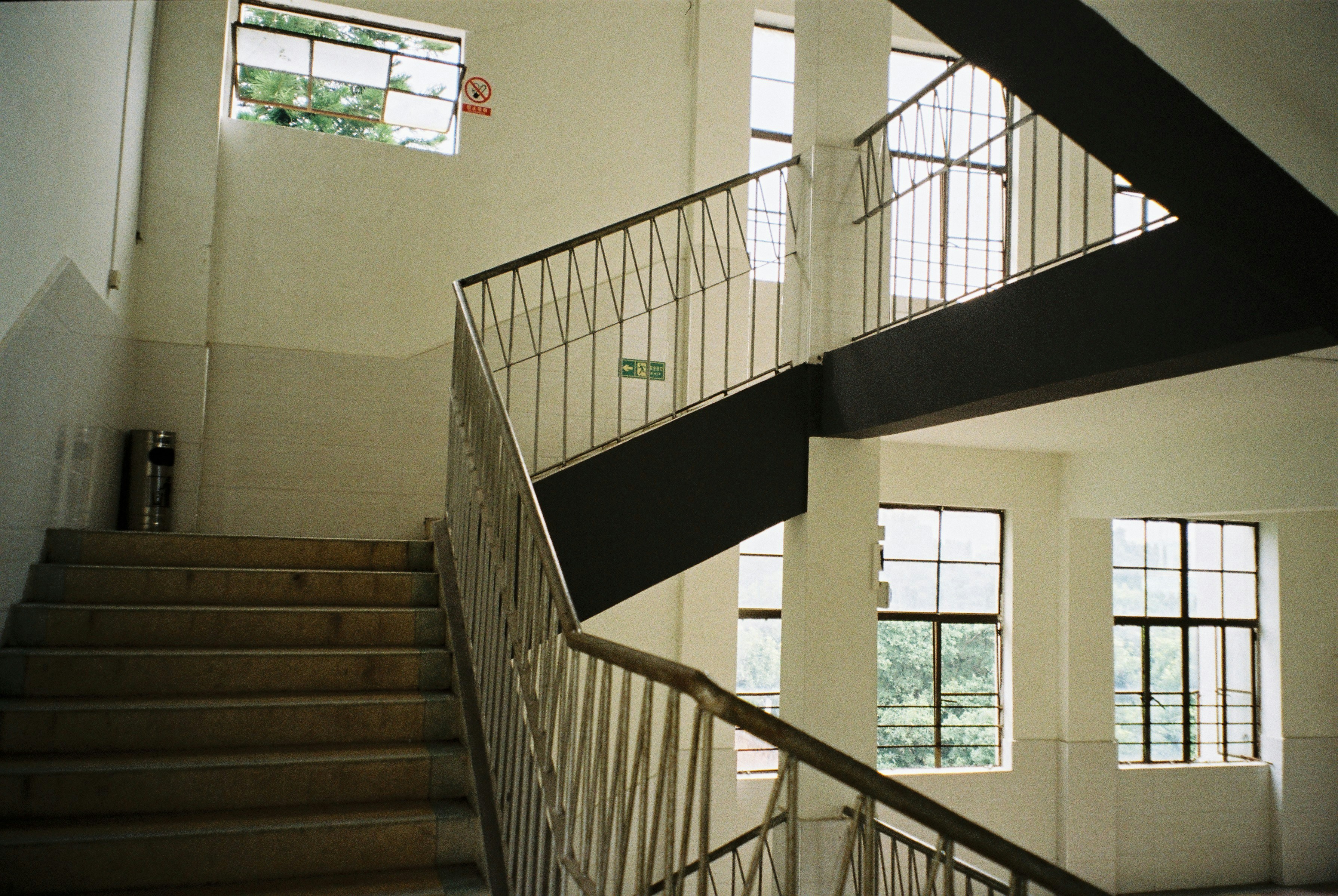 A stair case in a building with windows photo – Free Photography Image ...