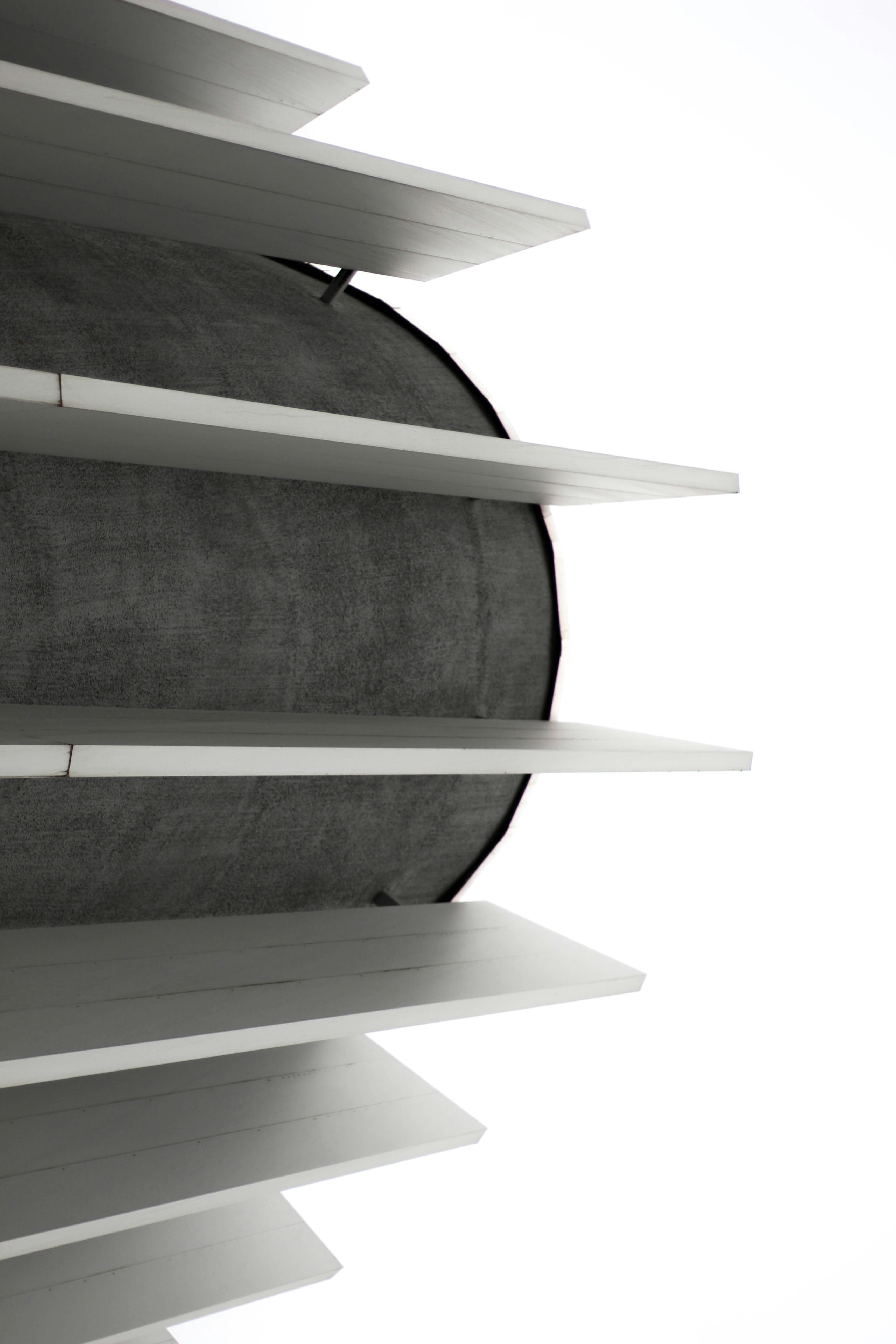 a black and white photo of a round objectAnna