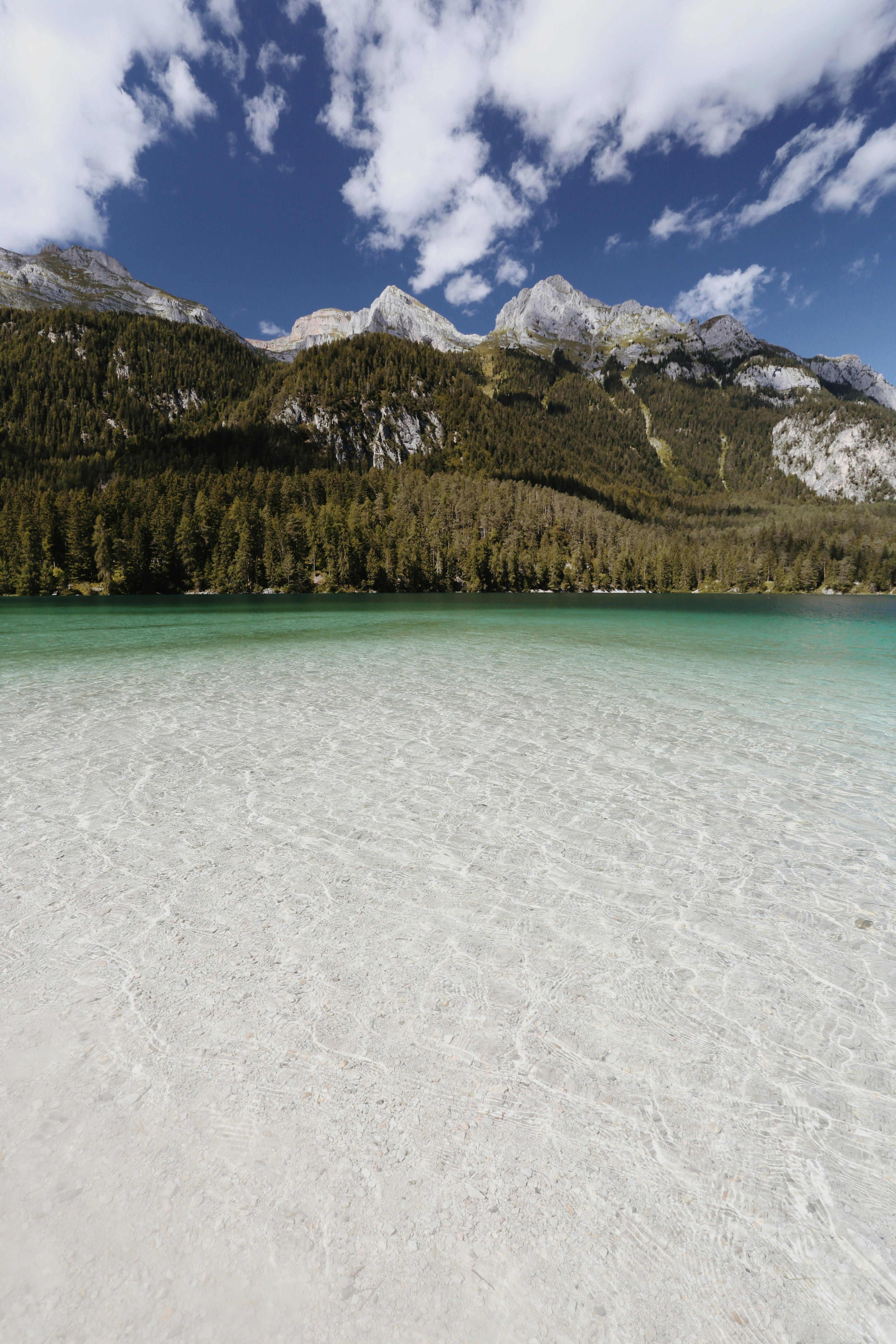Turquoise Edge: Lakefront Silence Beneath Alpine Giants