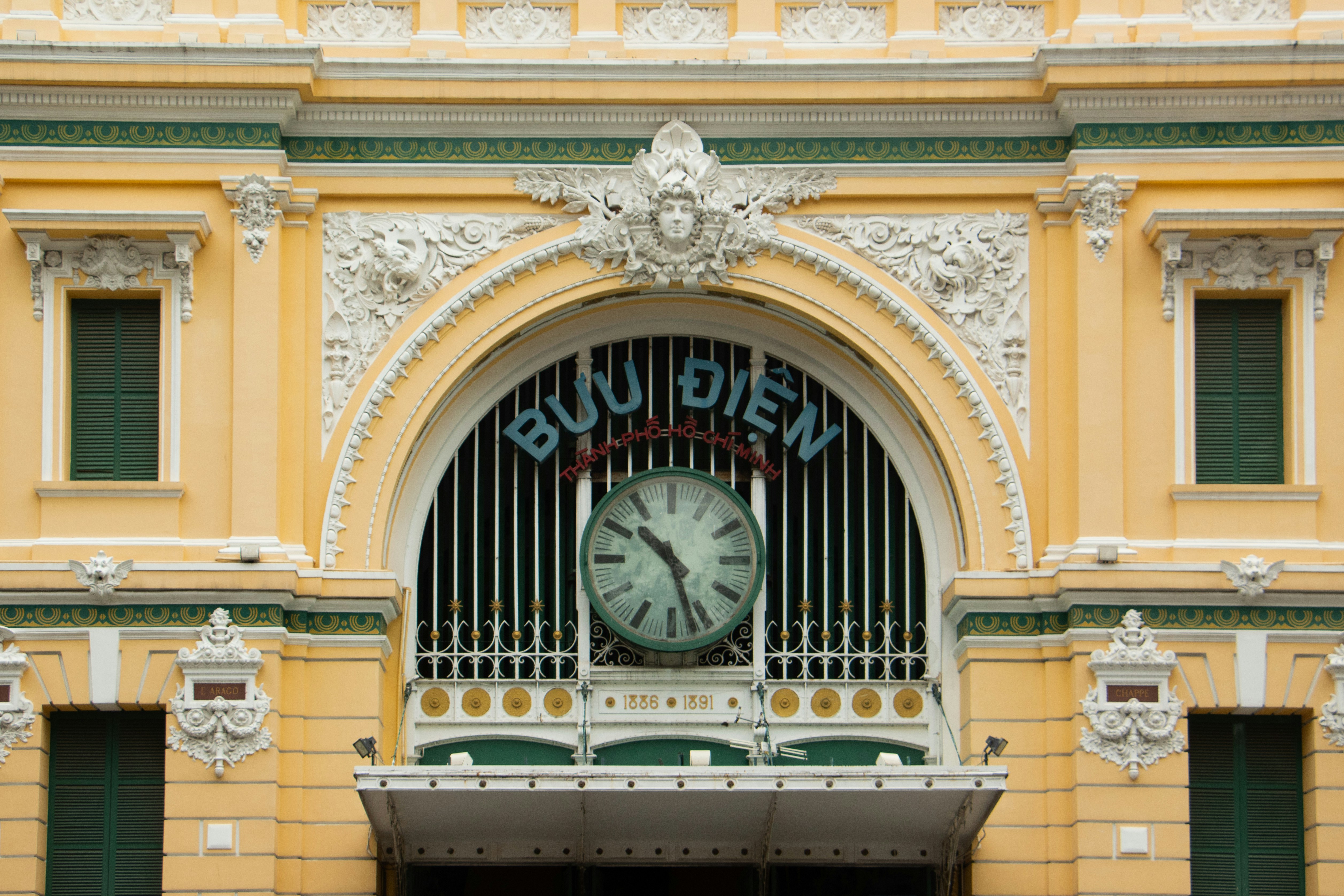 Clock Archway at Buu Dieu Station: Symmetry Beneath the City Facade