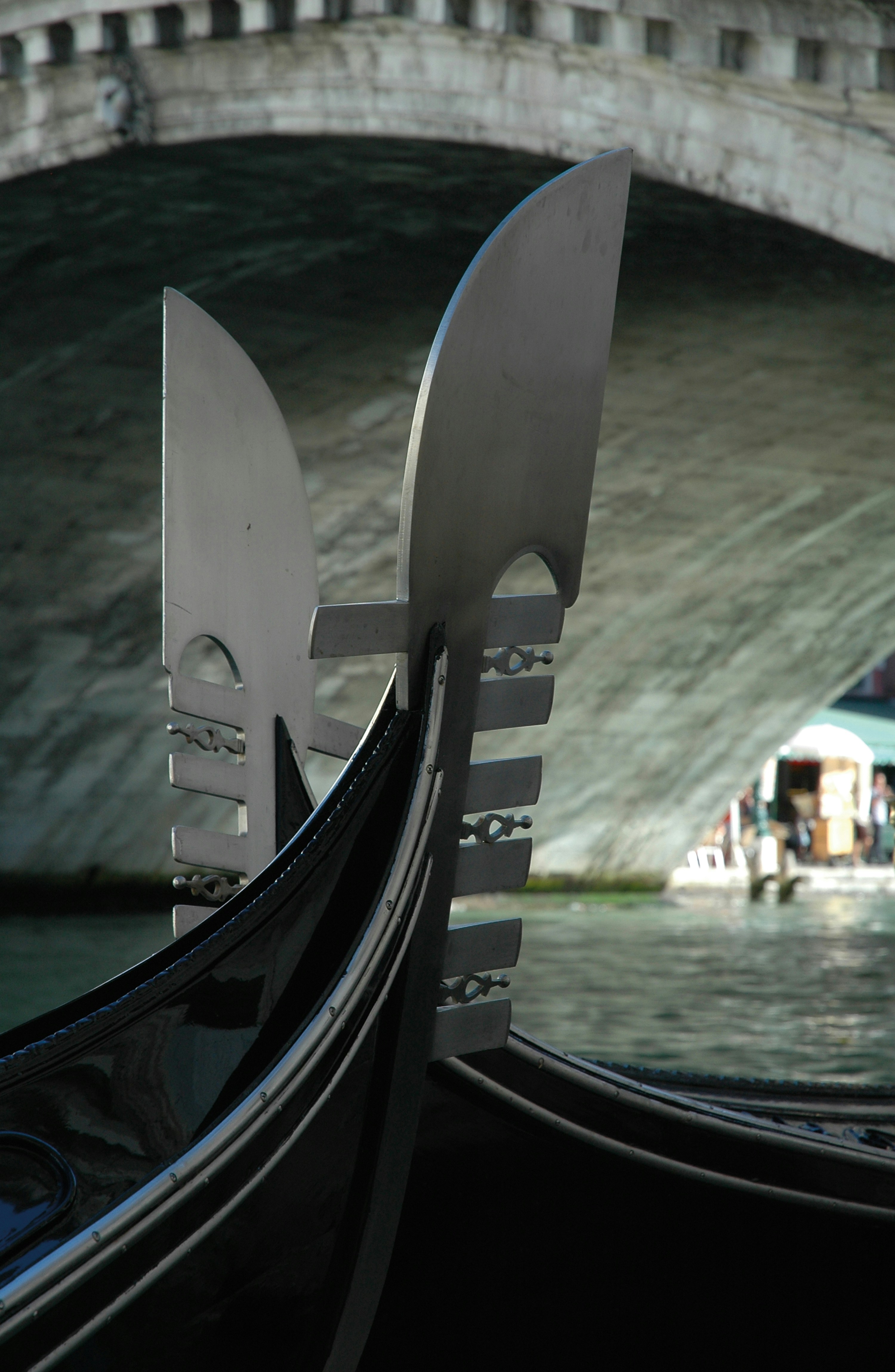 Gondola Ferro Framed by a Venetian Arch