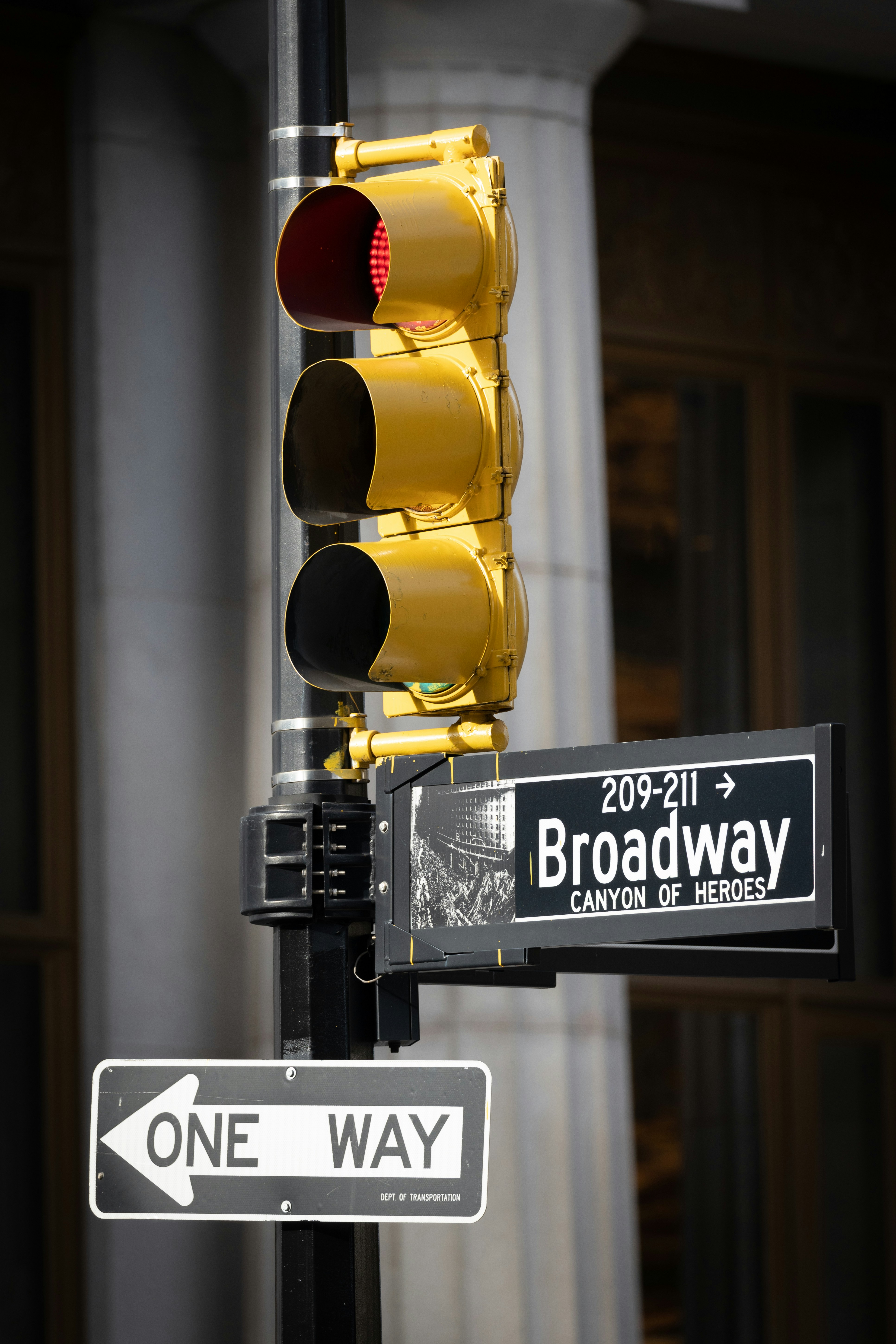 A traffic light sitting next to a one way sign photo – Free Street ...