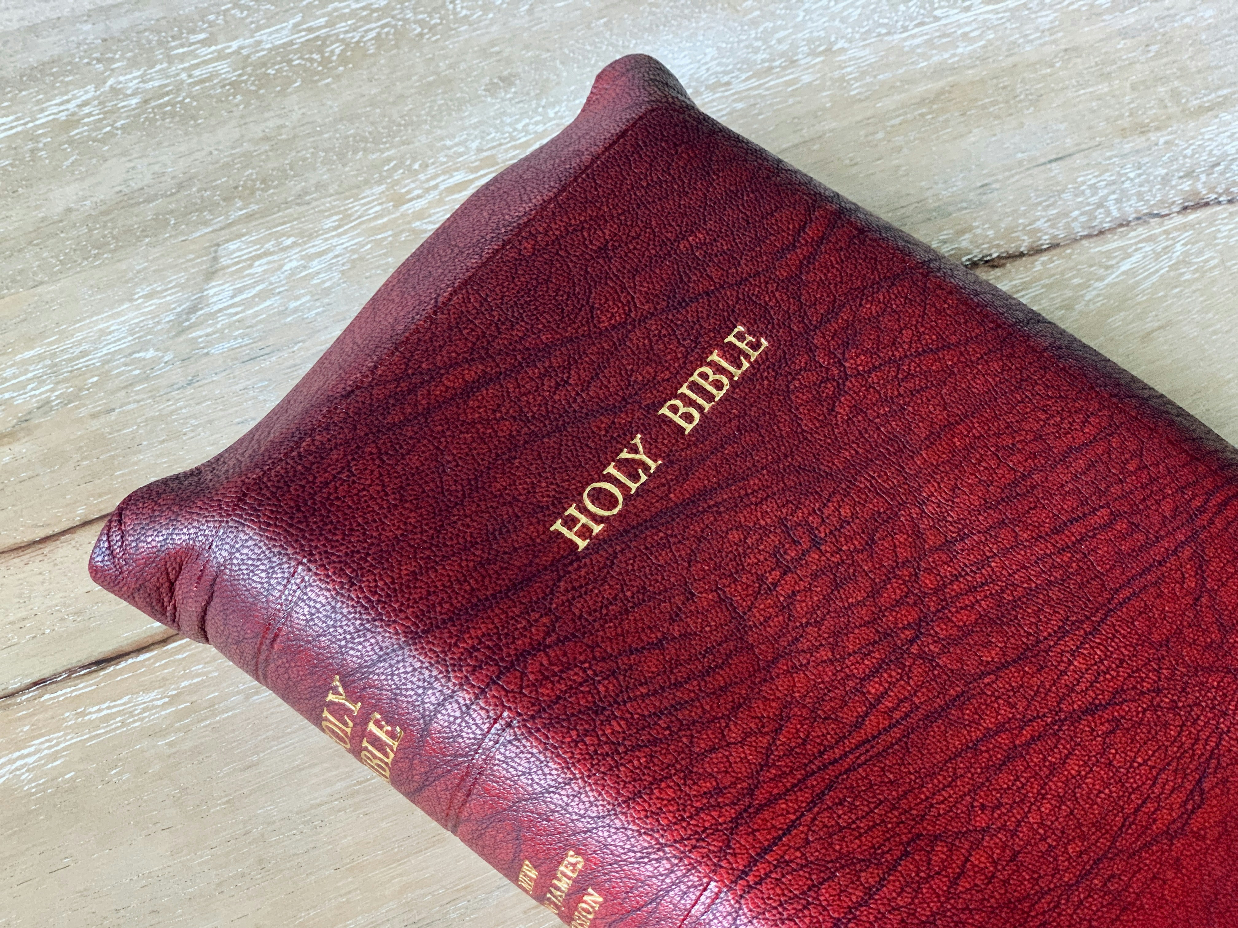 A close up of a bible on a wooden surface photo – Free Faith Image on ...