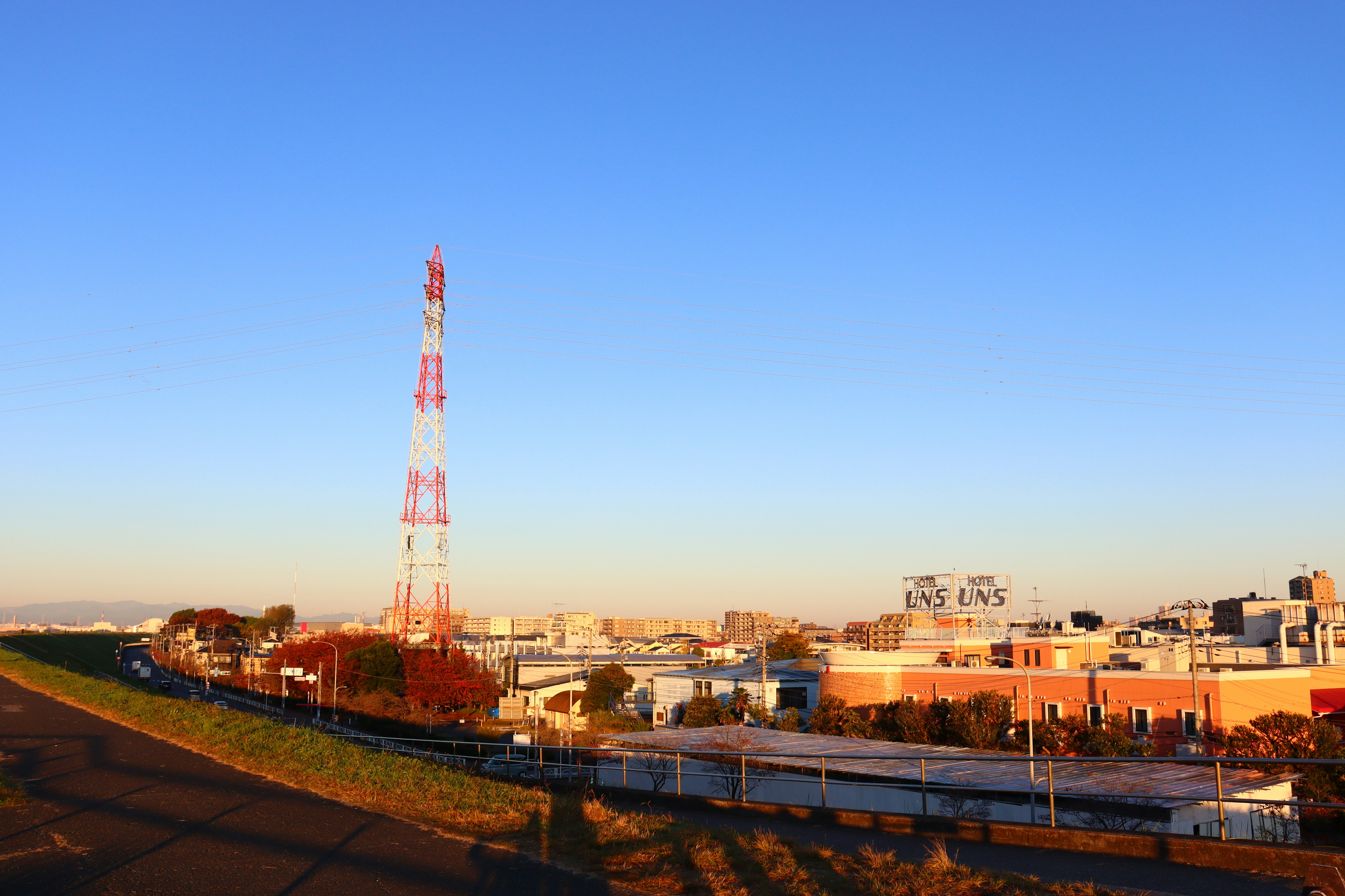 A view of a city with a radio tower in the distance photo – Free 埼玉県 ...