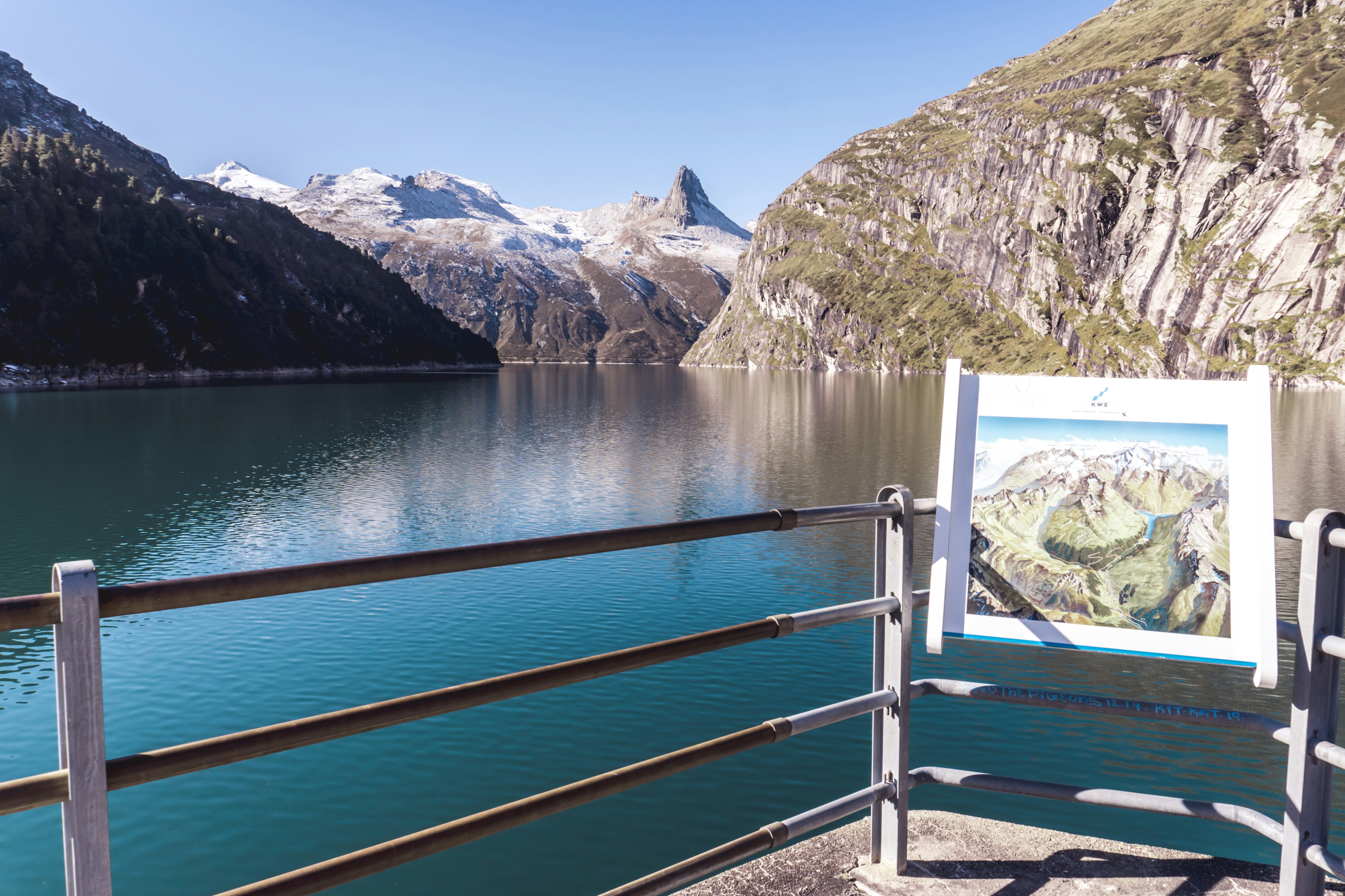 Glacial Fjord View: Central Peak Framed by Rails and Turquoise Waters