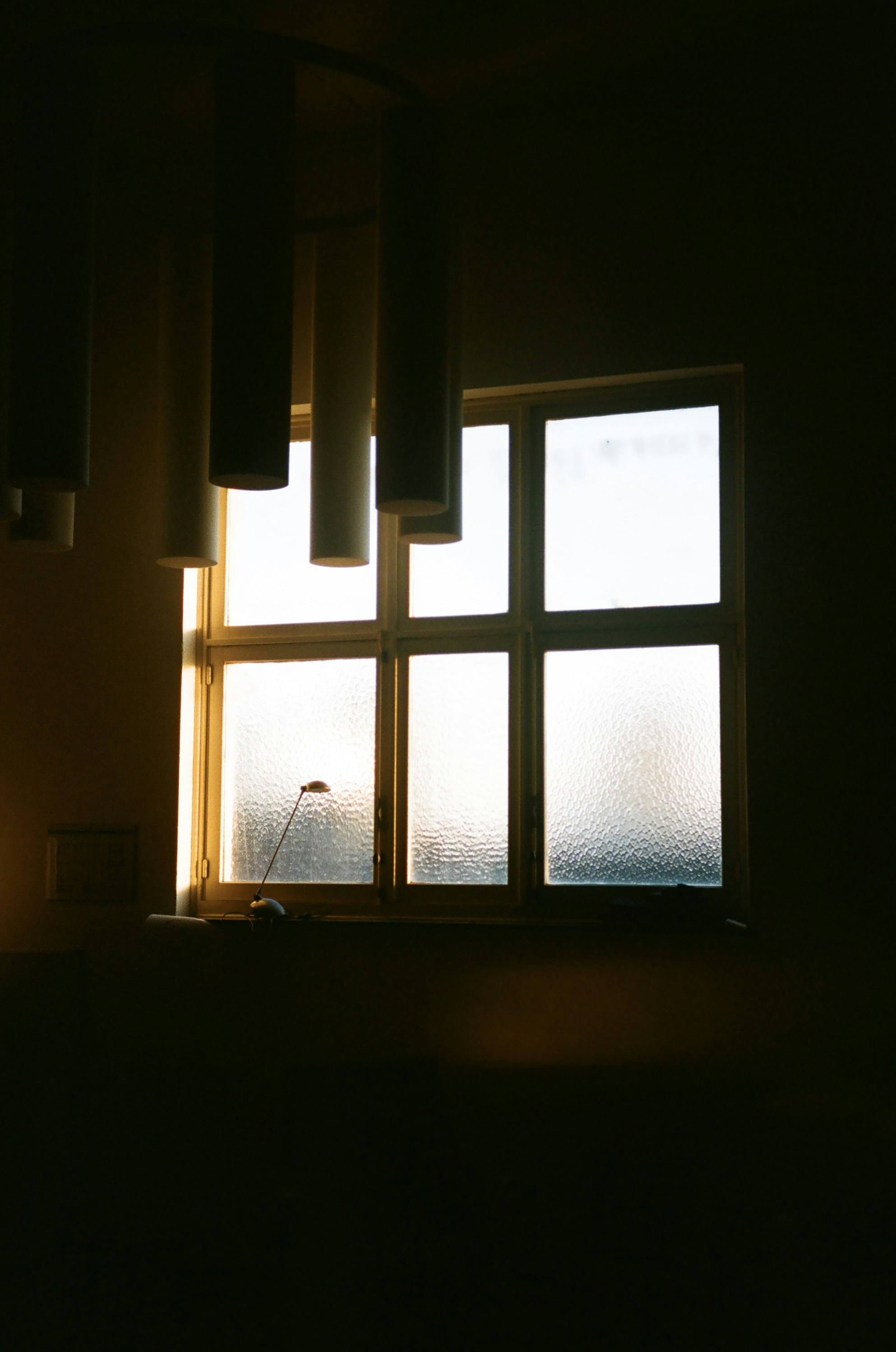 A window with a light shining through it photo – Free Statik Image on ...