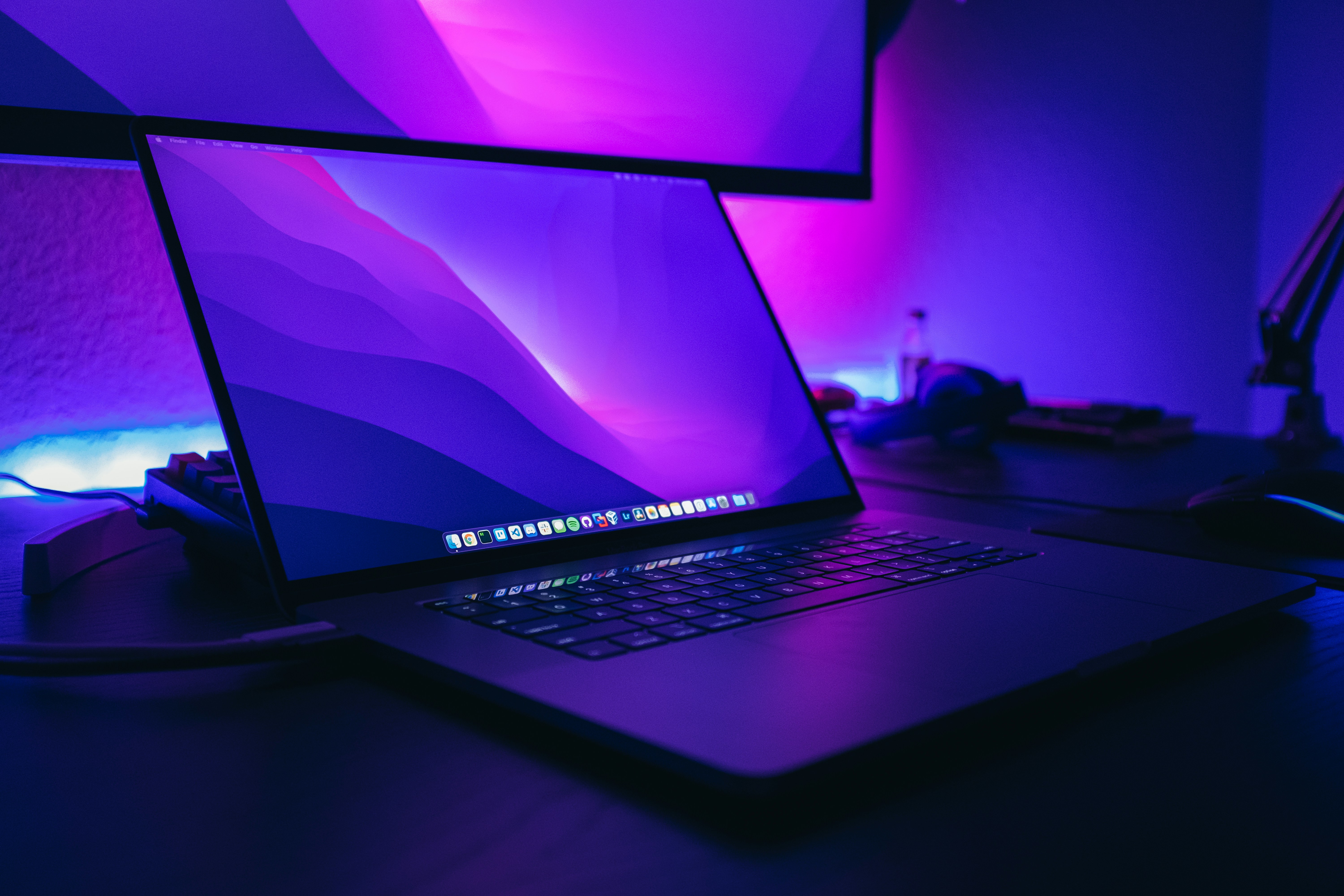 A laptop computer sitting on top of a wooden desk photo – Free Computer ...