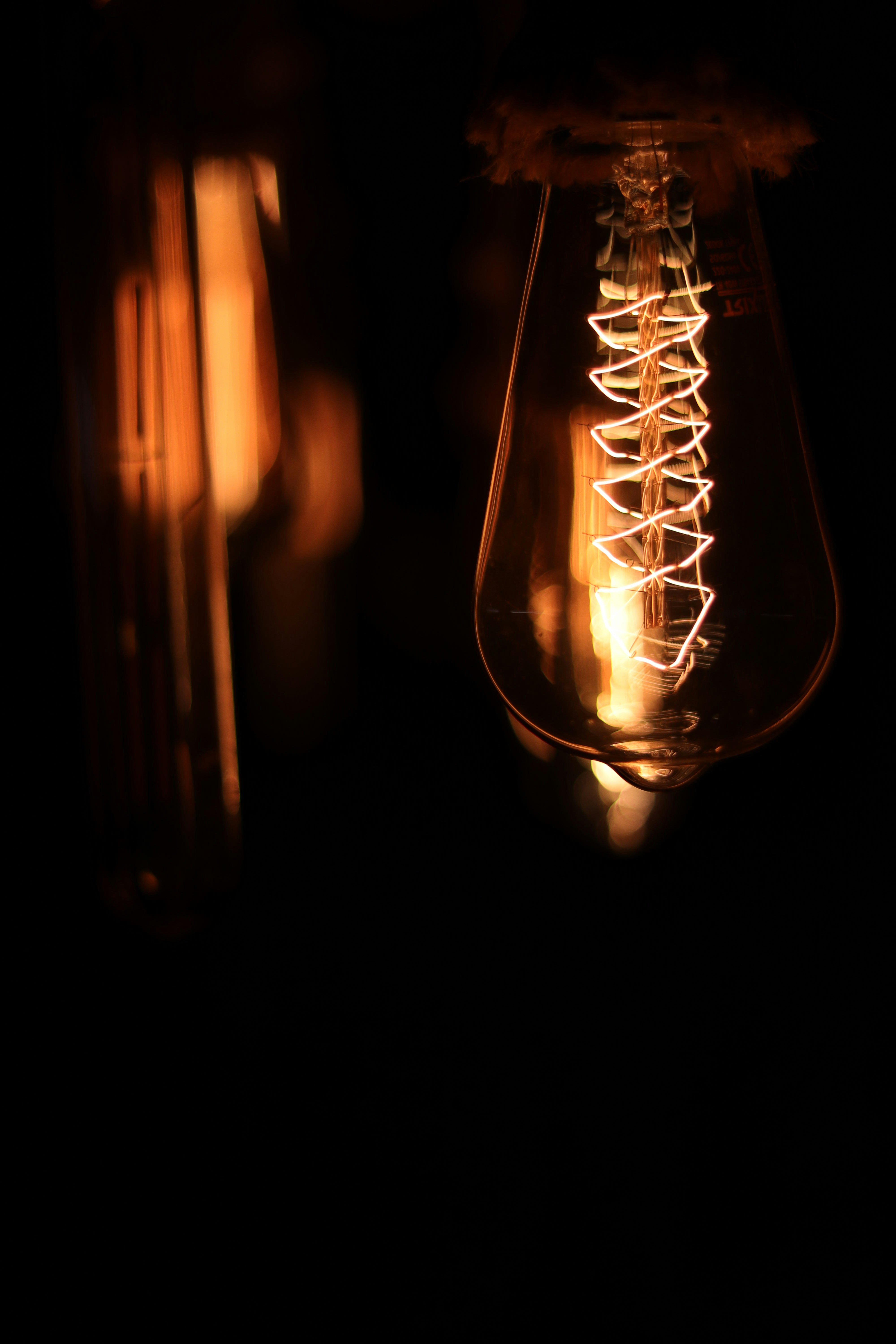 A light bulb with a string wrapped around it photo – Free Light Image ...