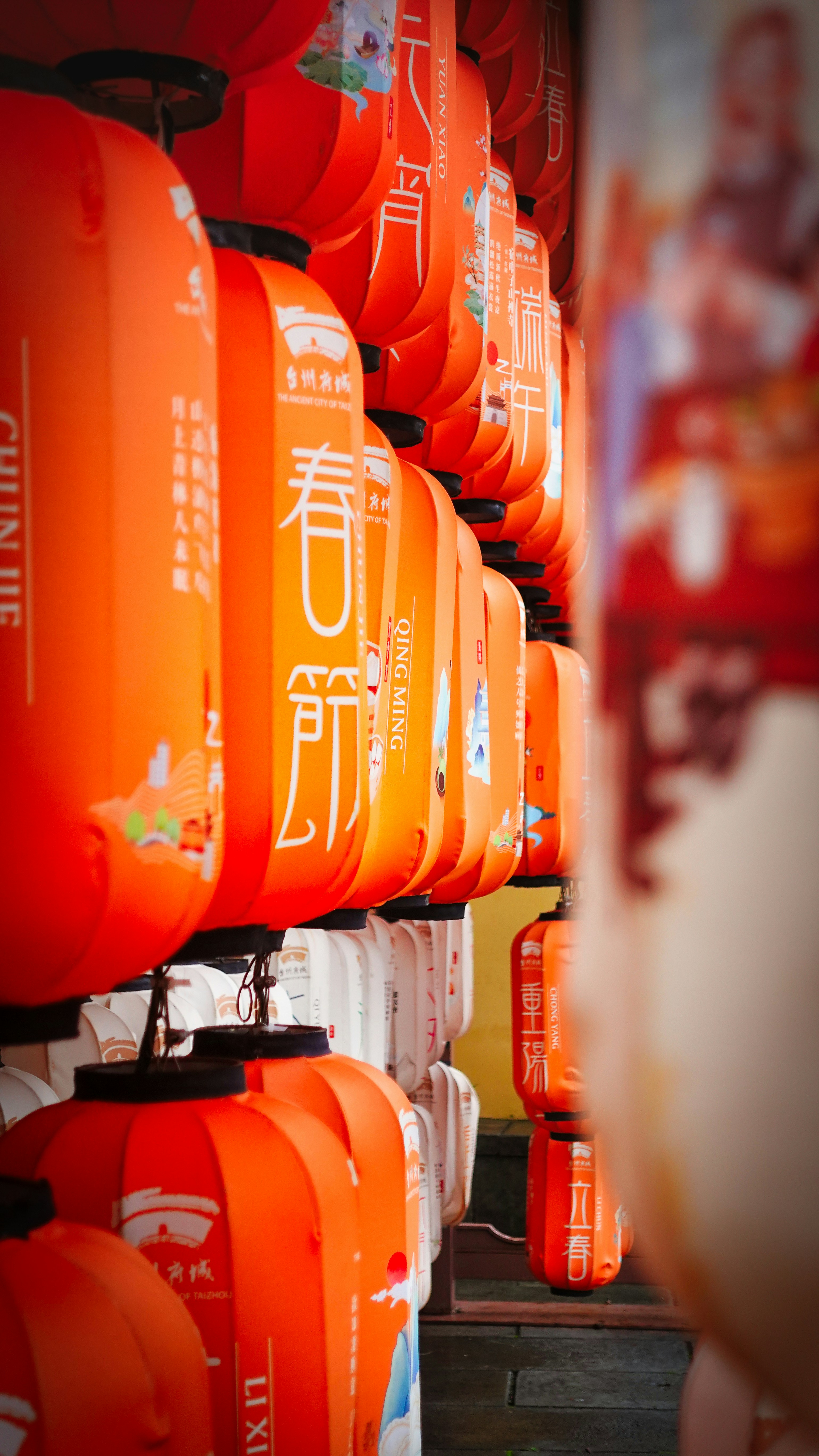 Crimson Lantern Corridor: A Narrow Alley of Warm Orange Light