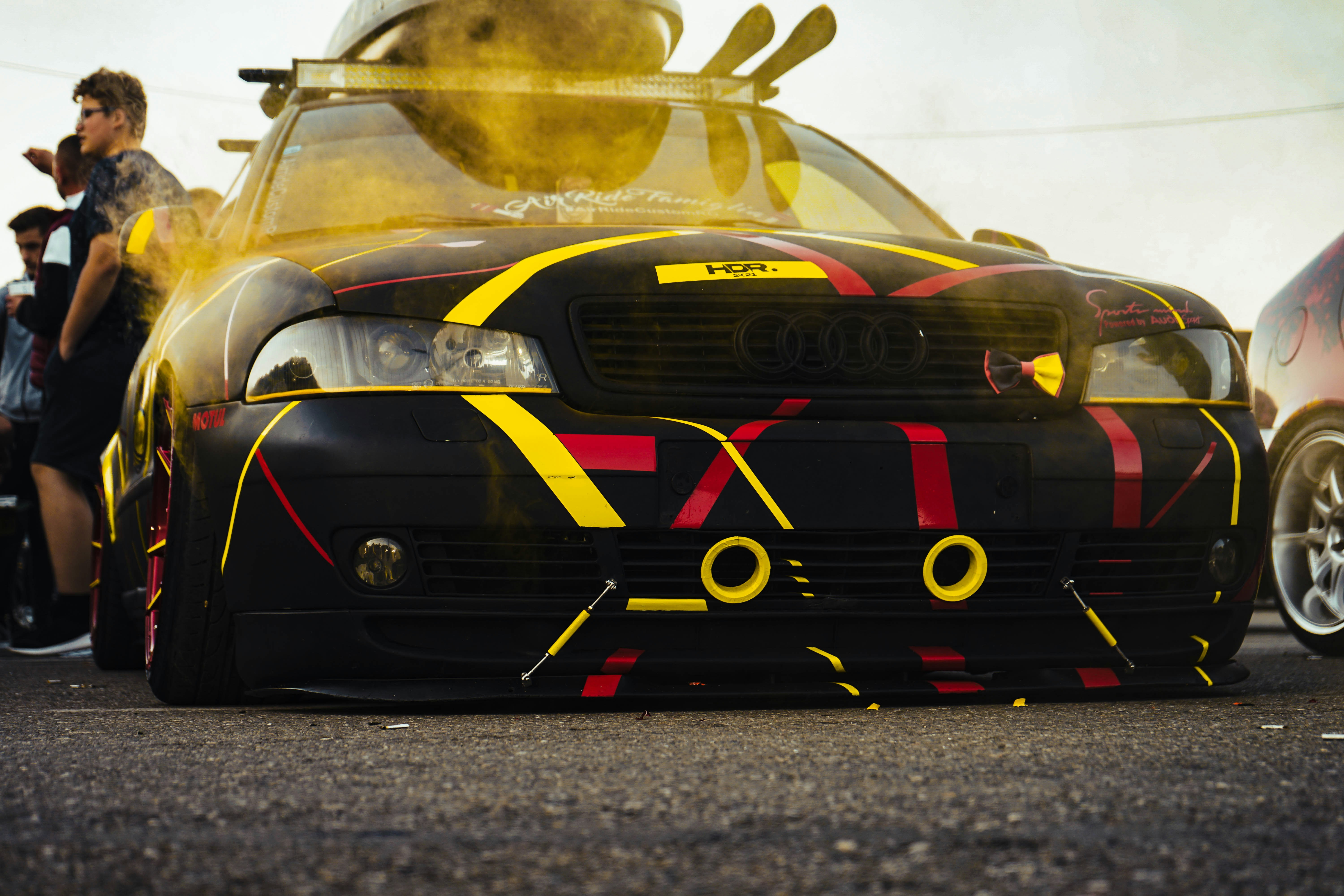 a car with yellow smoke coming out of it