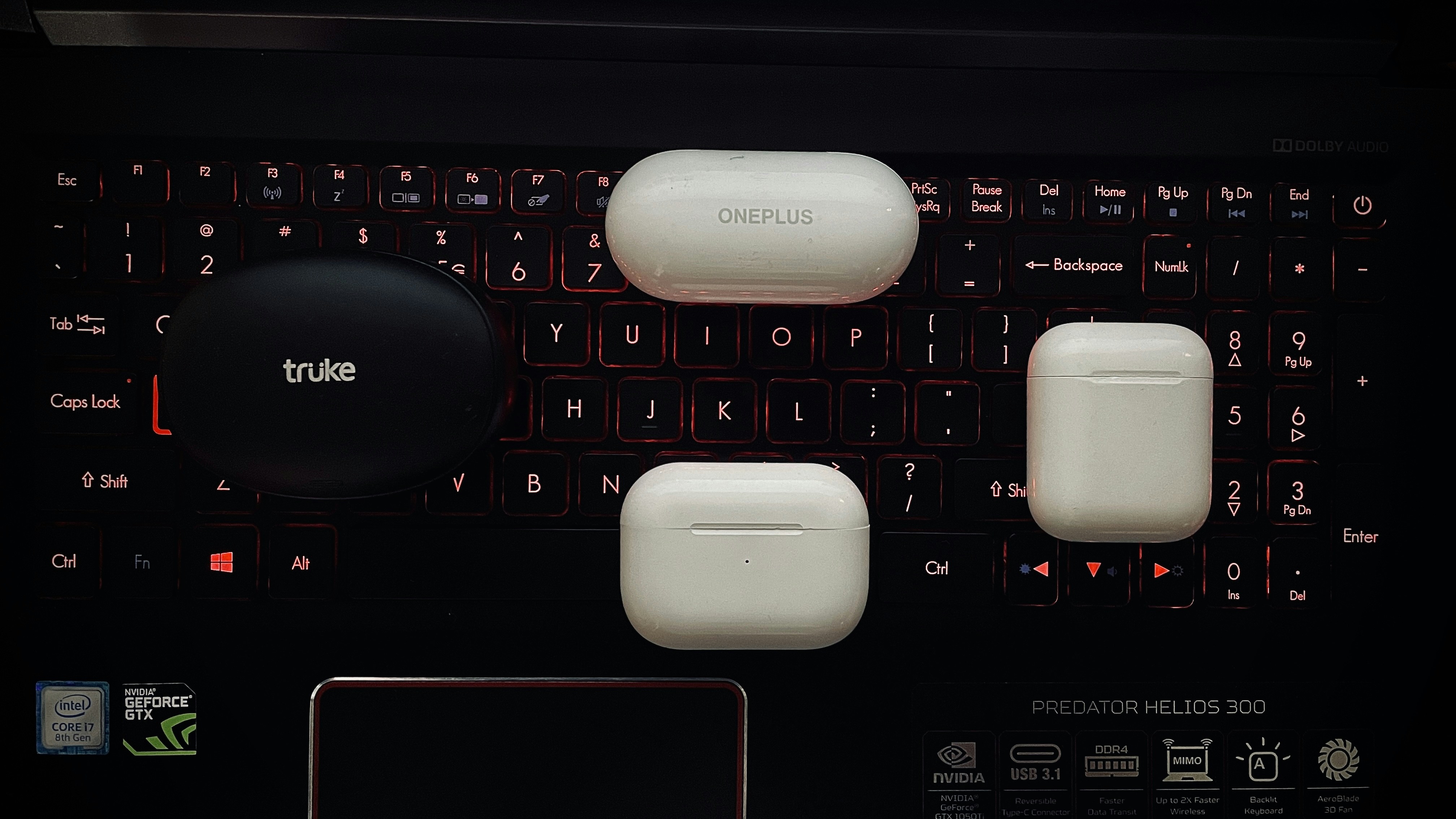 A close up of a keyboard with three air pods photo – Free Computer ...