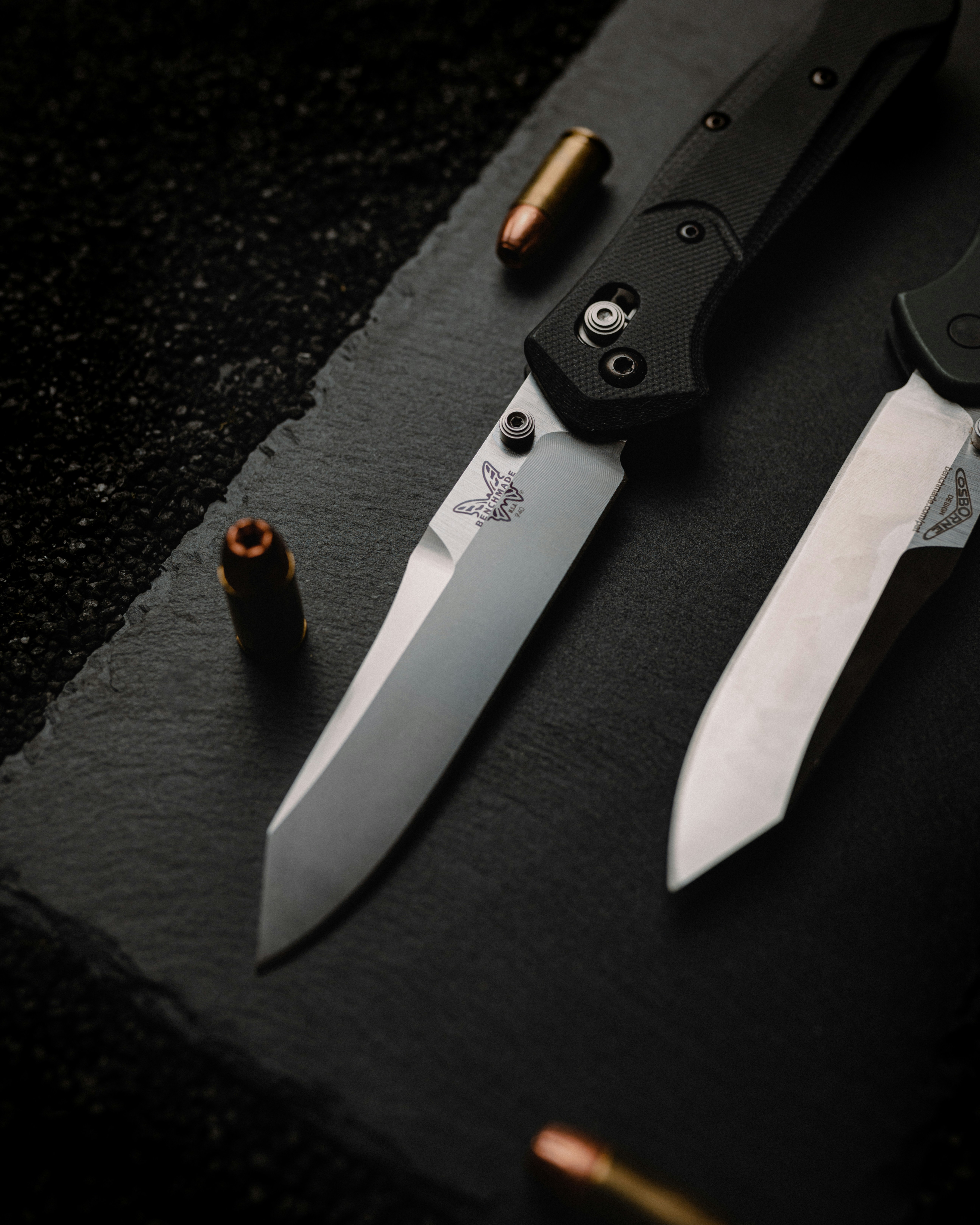 A couple of knives sitting on top of a table photo – Free Grey Image on ...