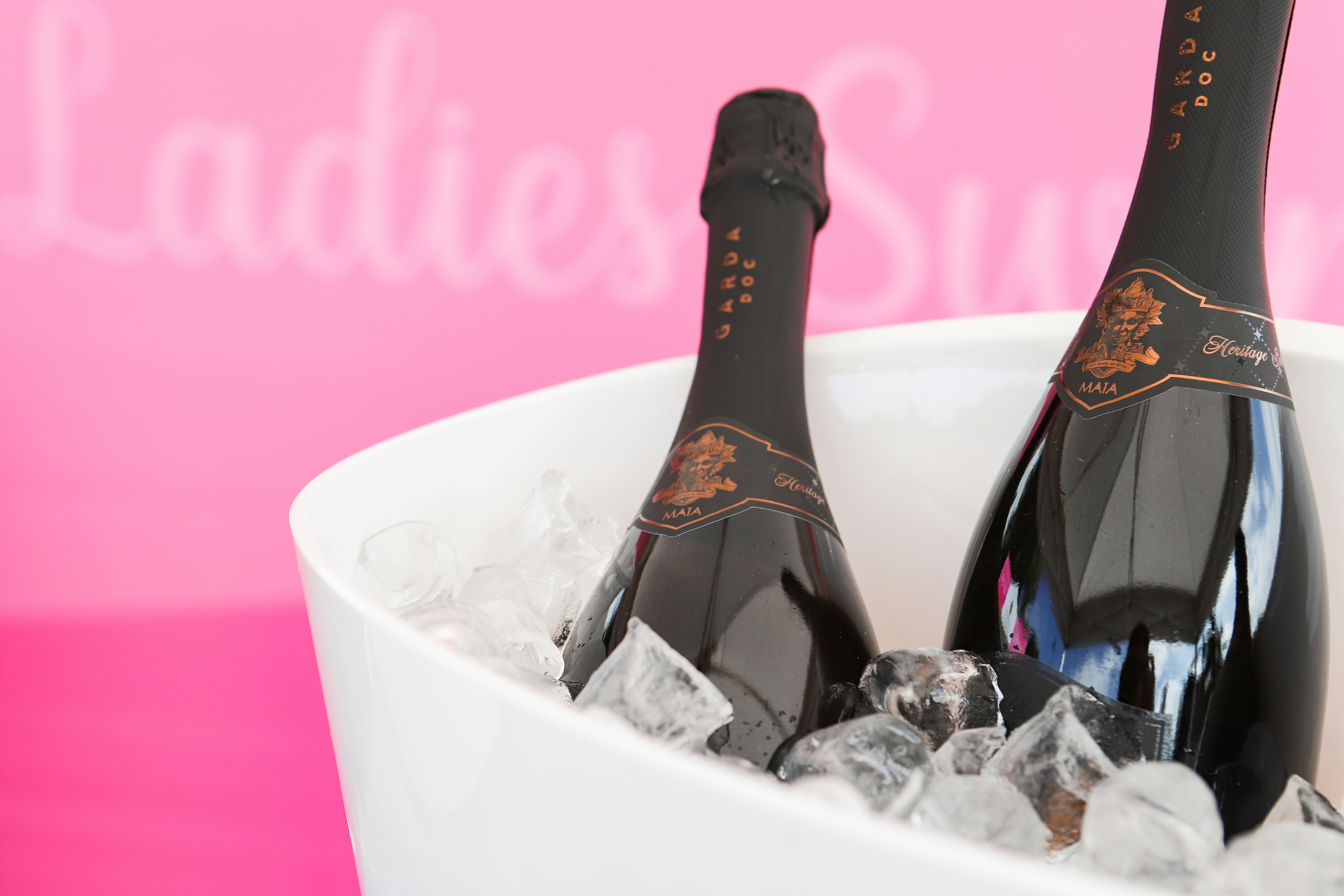 Ice-Cold Celebration: Bottles Nestled in Crystal White