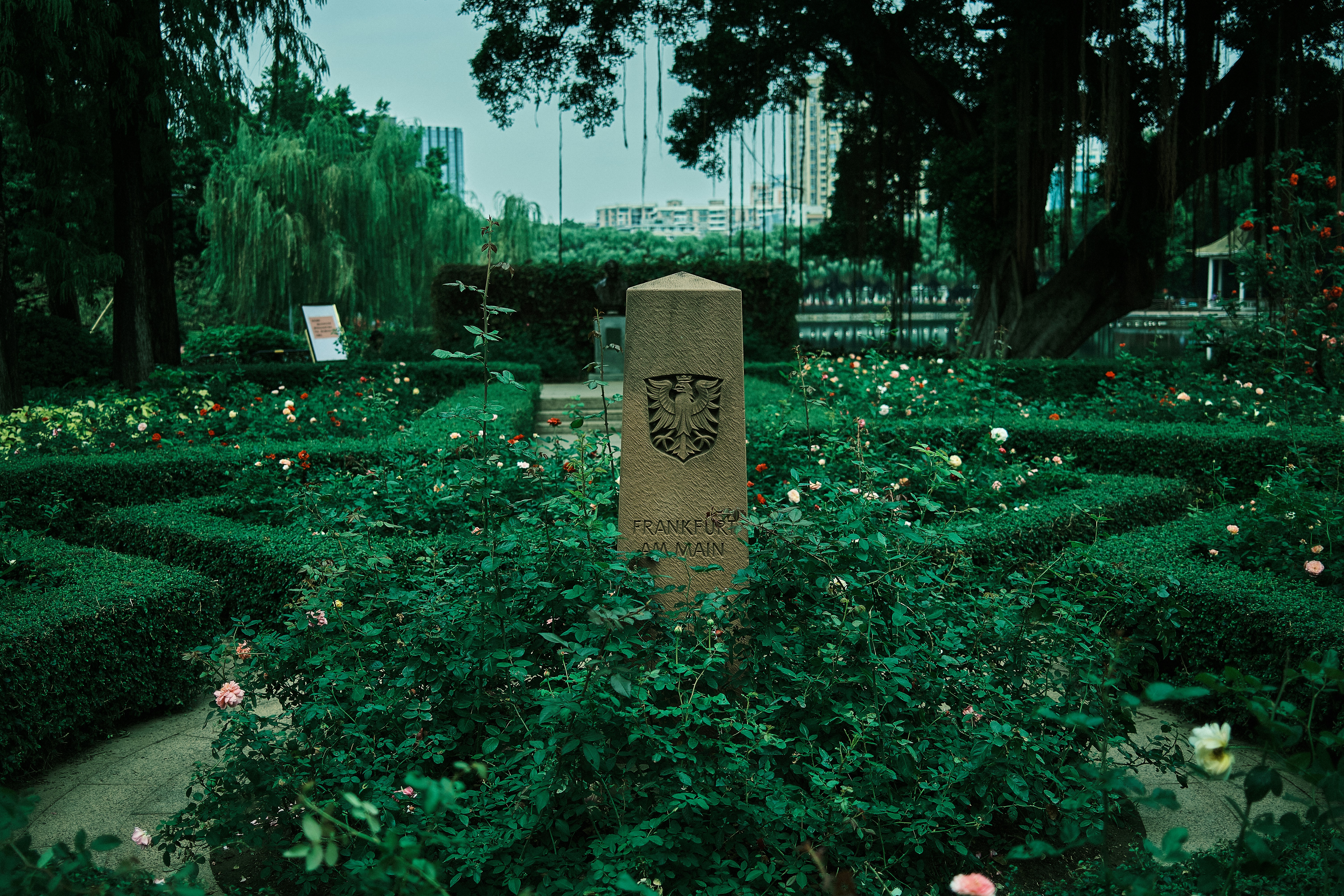 Stone Sentinel at the Center of a Rose-Parterre Labyrinth