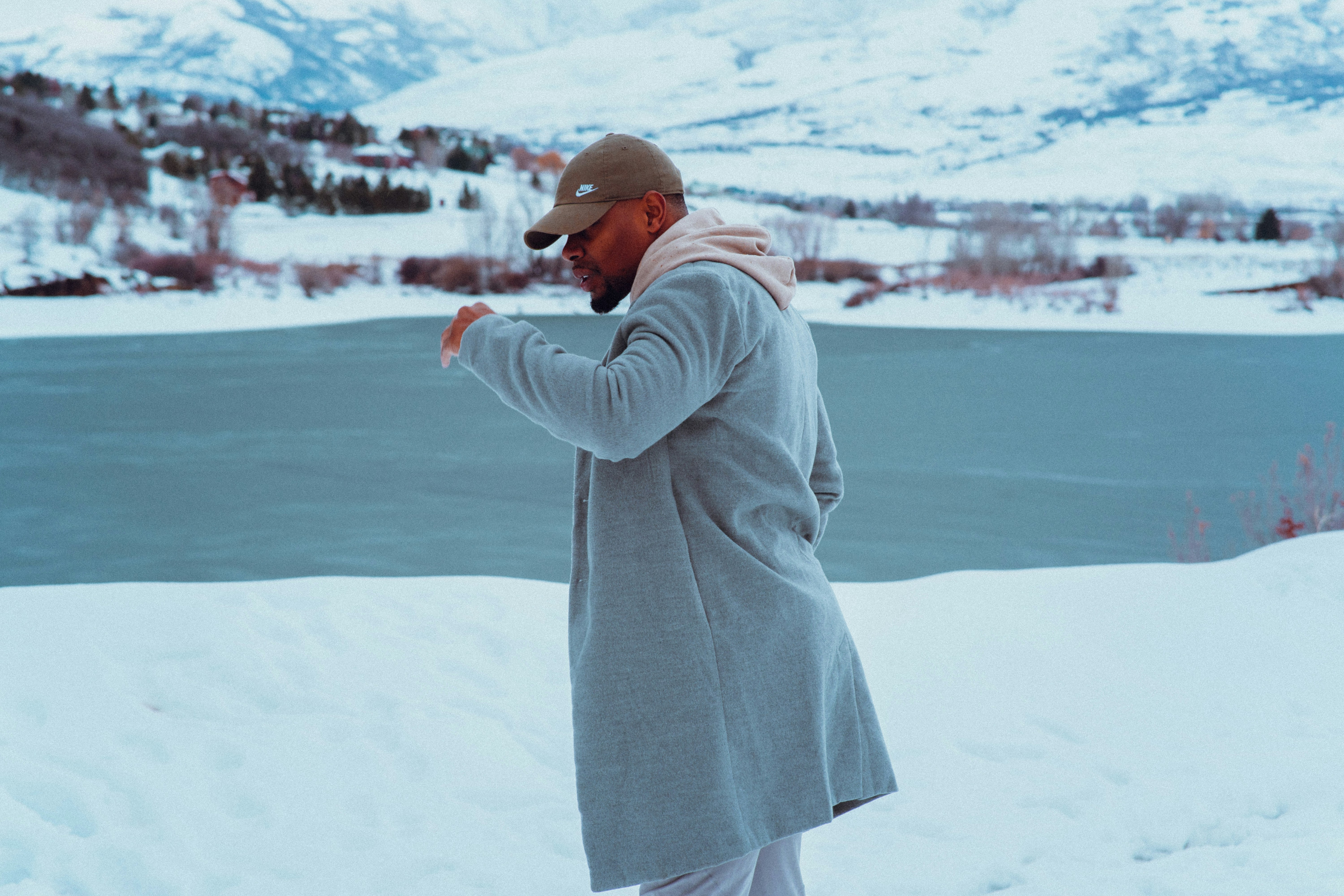 Winter Portrait in a Snowfield: The Quiet Moment with a Drape of Cold