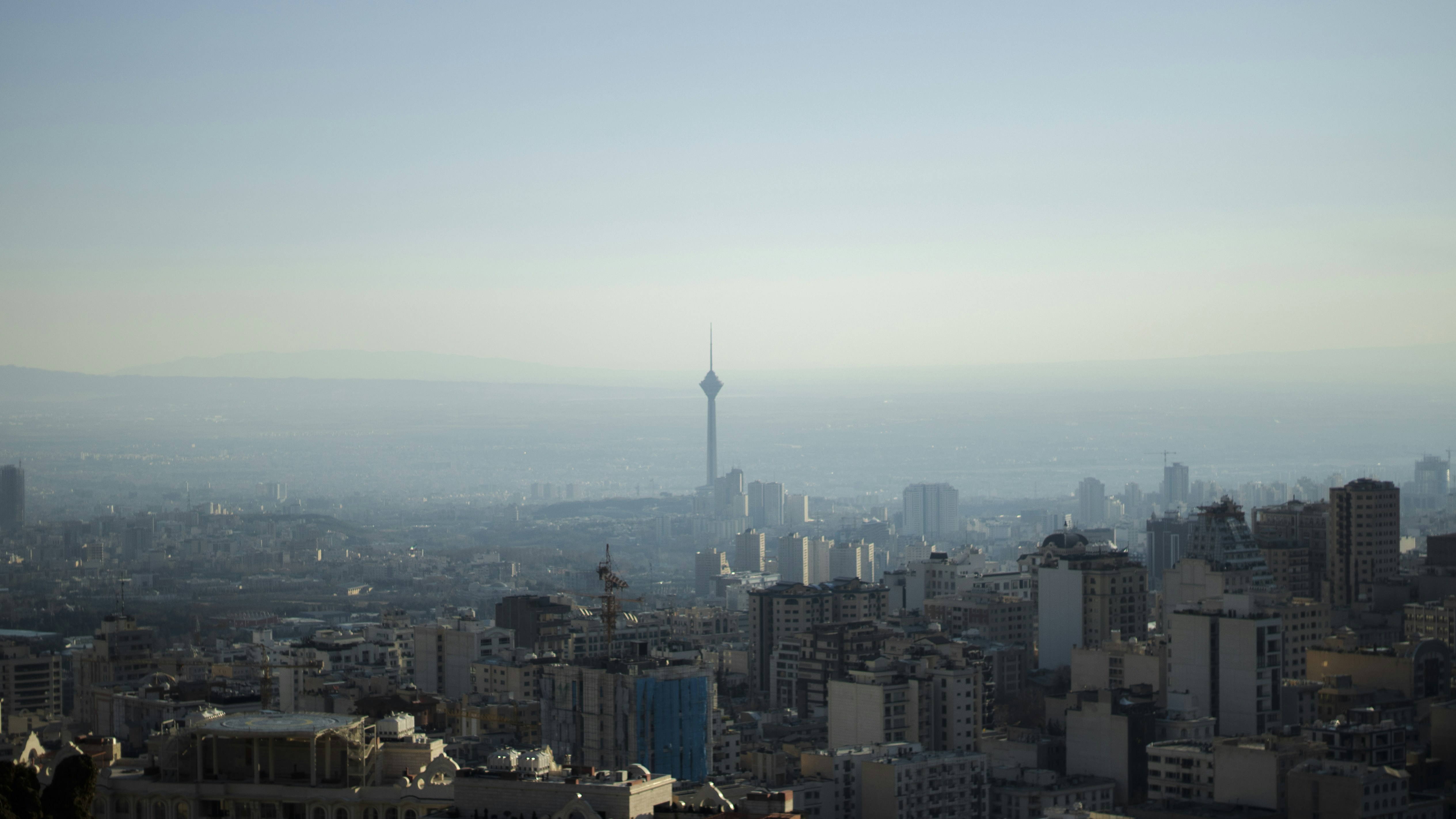 A view of a city with tall buildings photo – Free Tehran Image on Unsplash