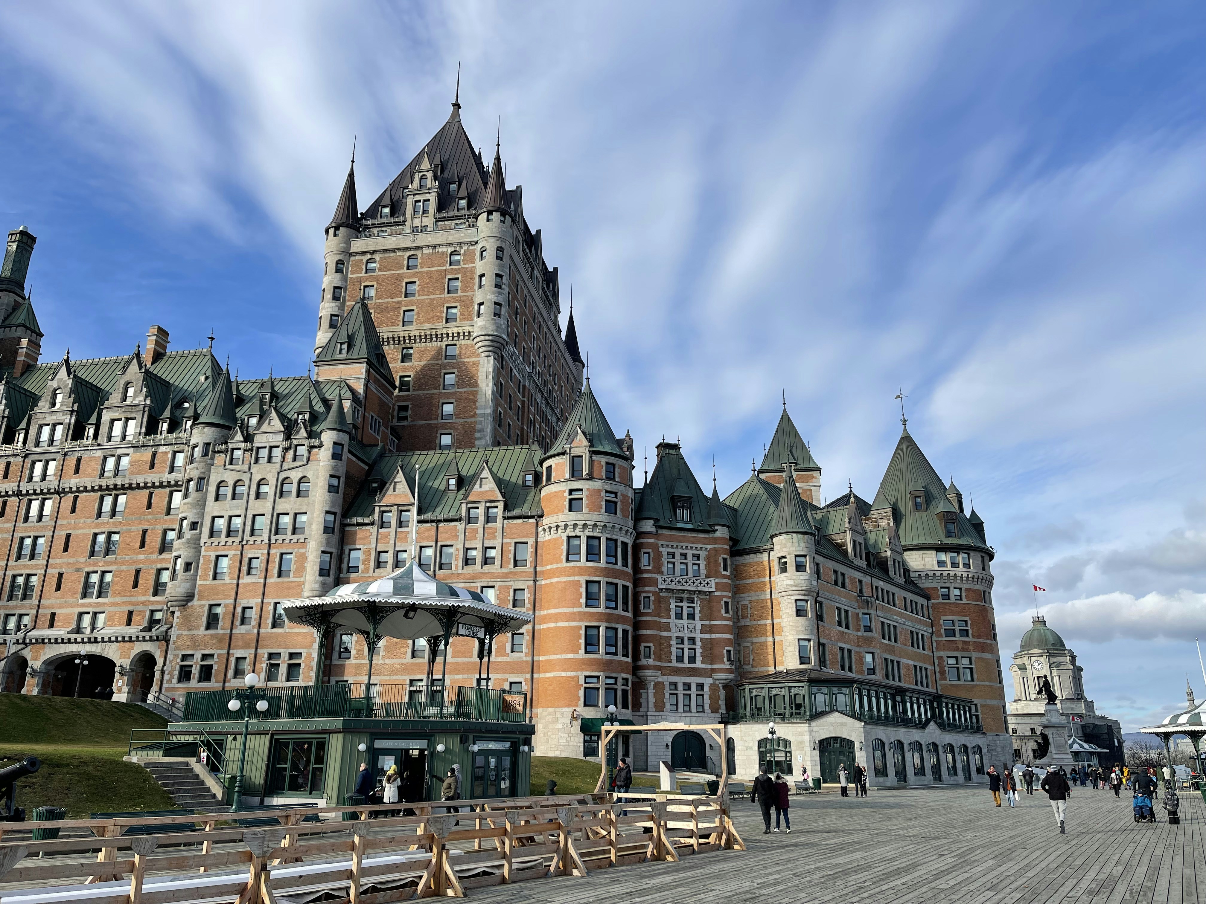 A large building with many windows and towers photo – Free Building ...