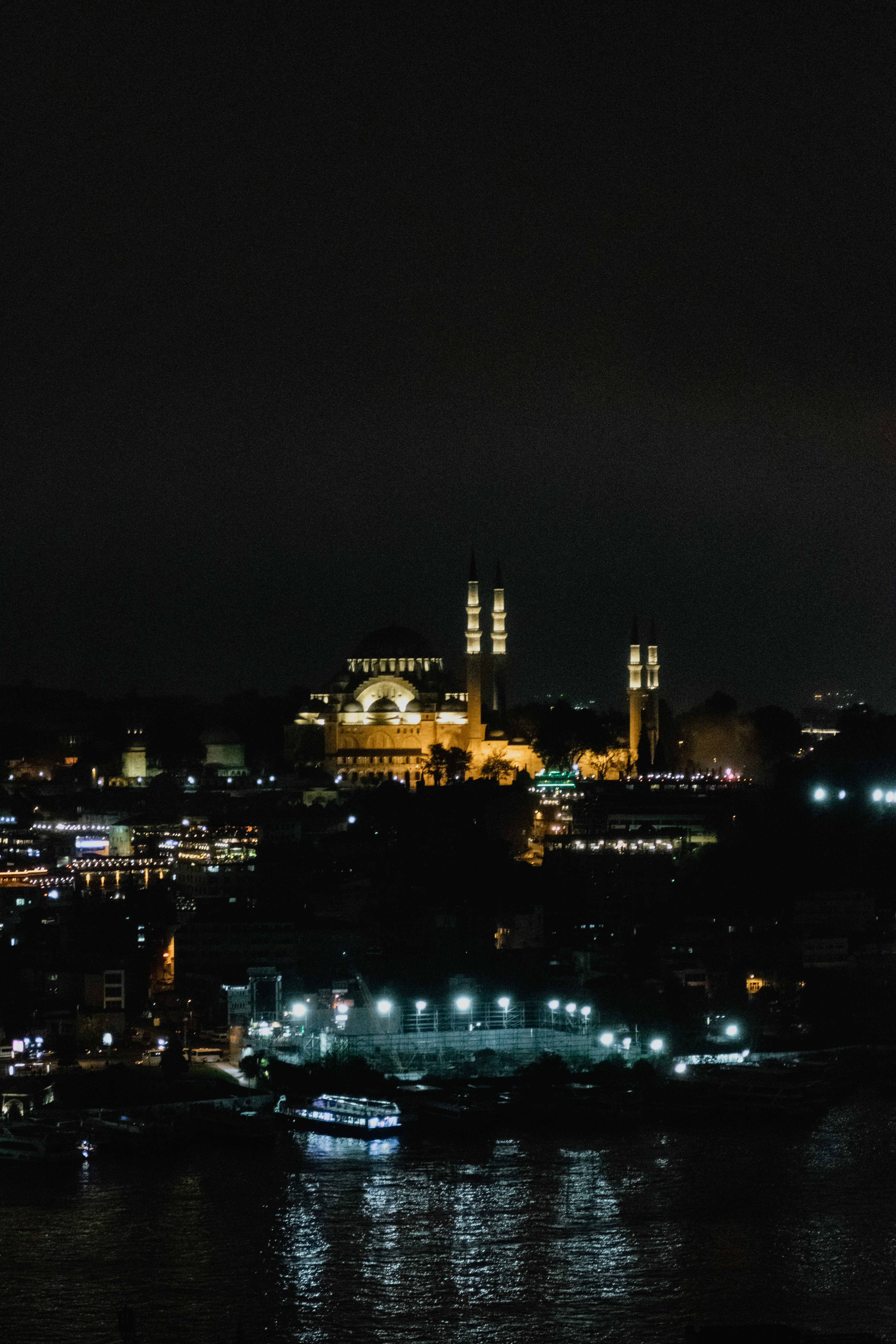 a view of a city at night from across the water