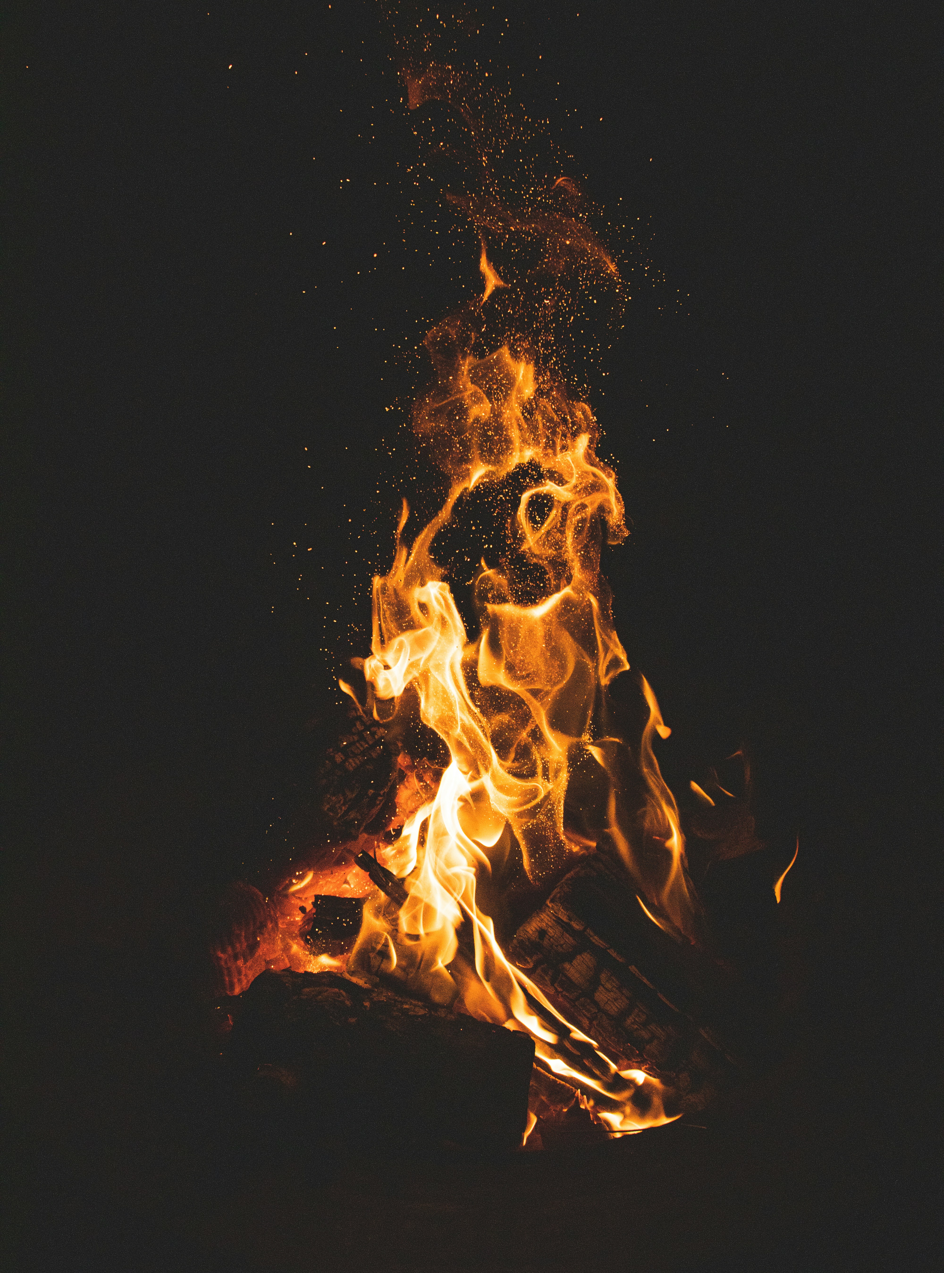 A fire burning in the dark with lots of flames photo – Free Fire flame ...