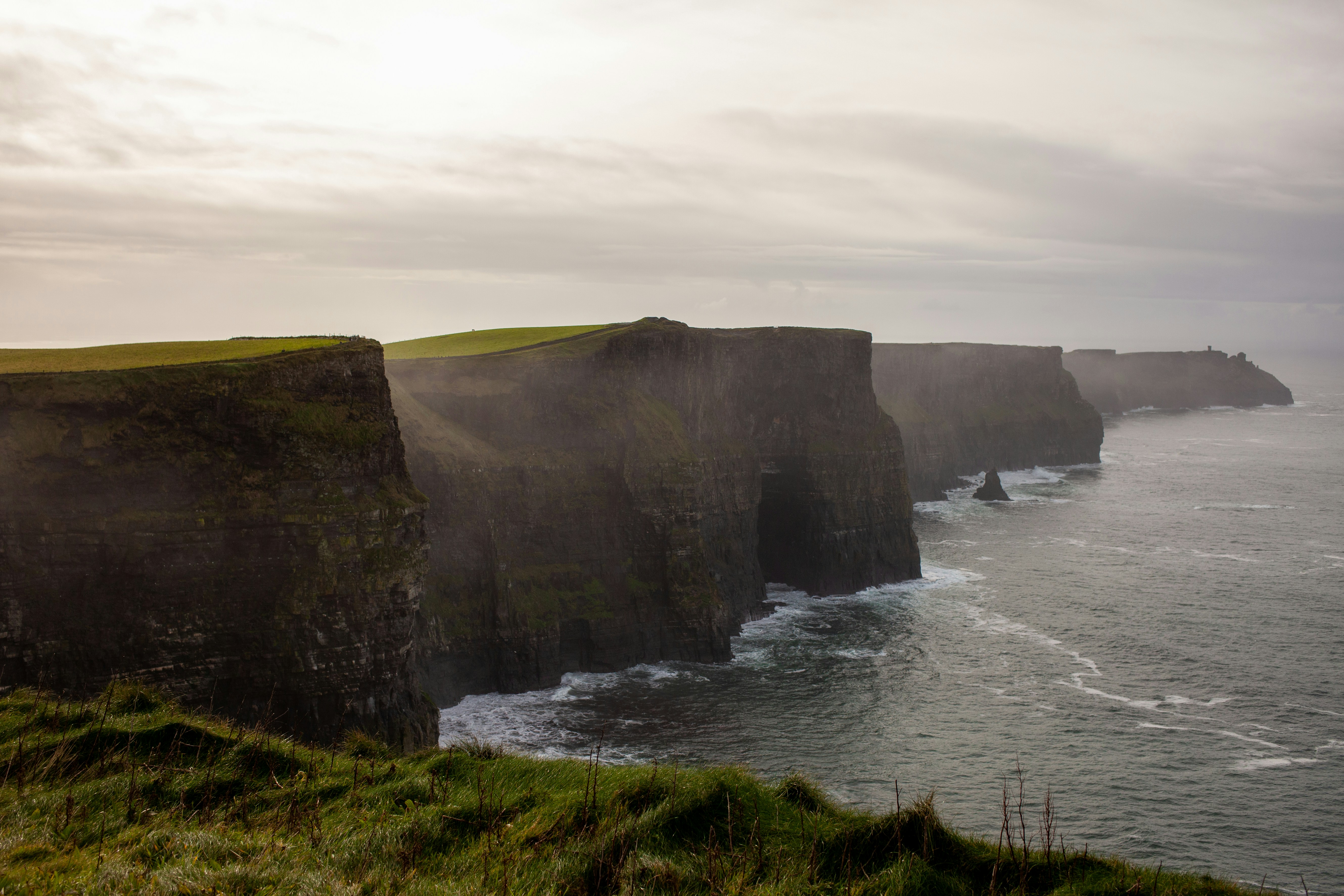 the cliffs of the coast line the ocean