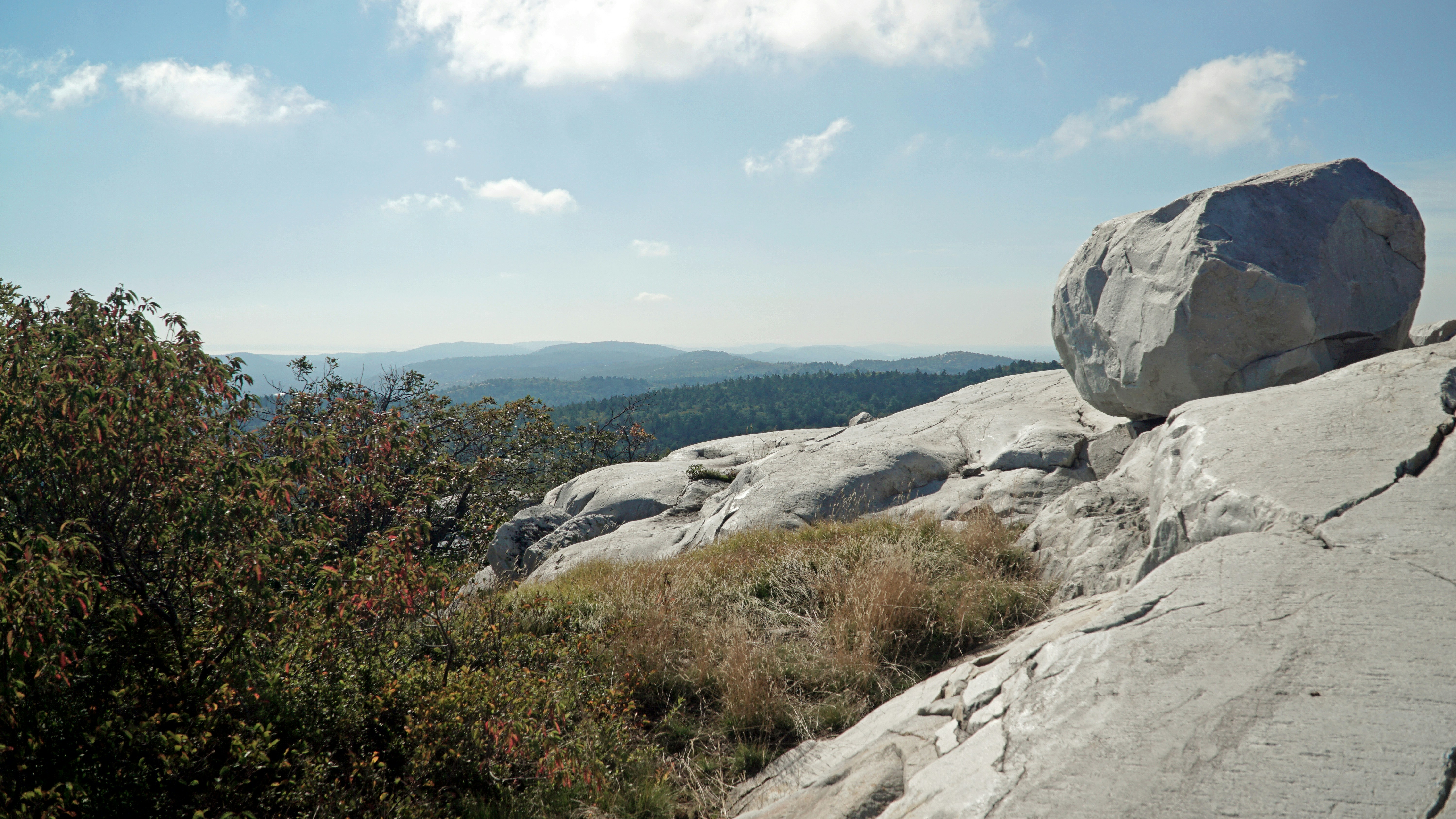 Granite Sentinel on the Ridge, Framing a Distant Horizon