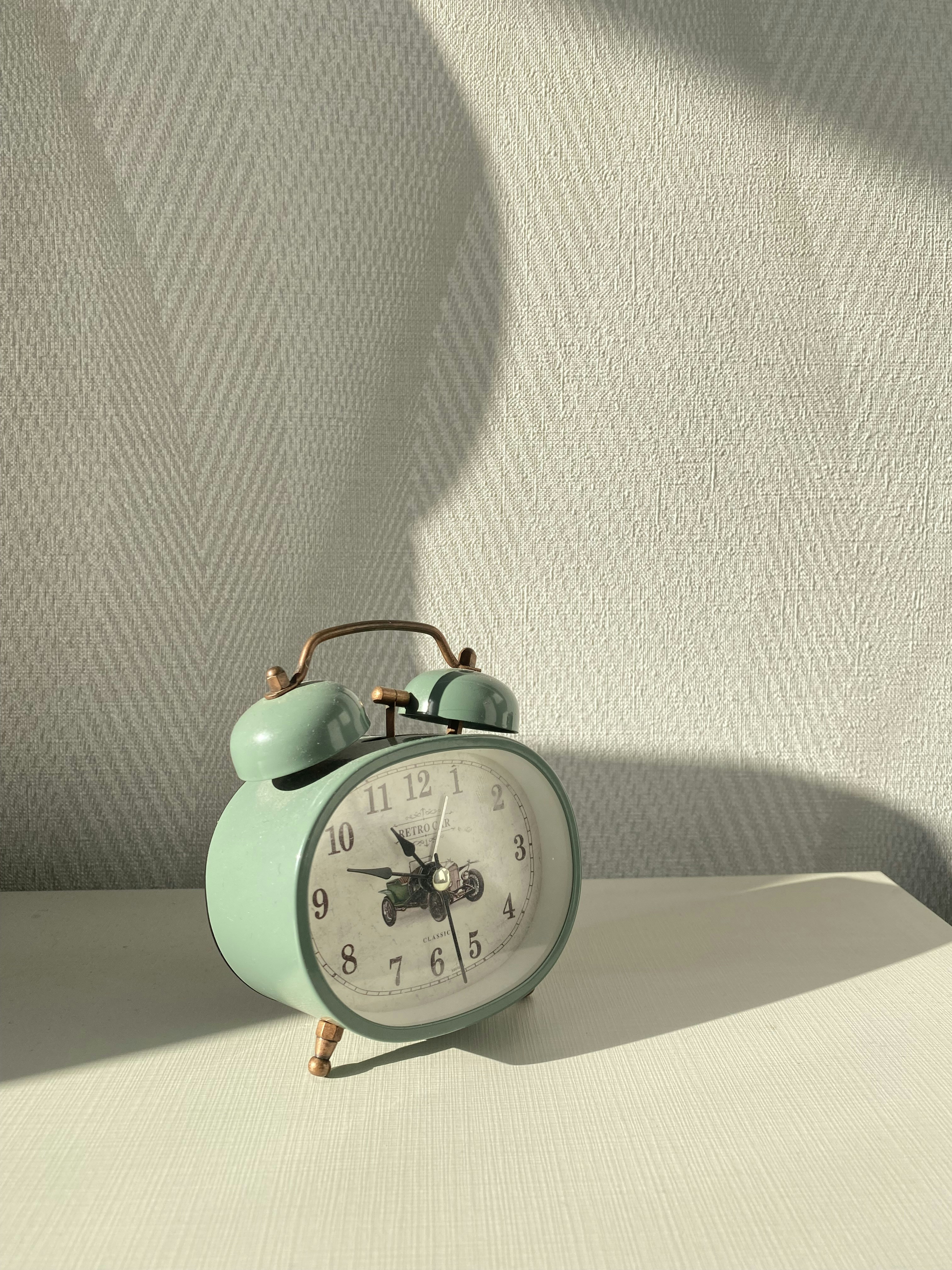 Minty Timekeeper: A Retro Alarm Clock in Quiet Morning Light
