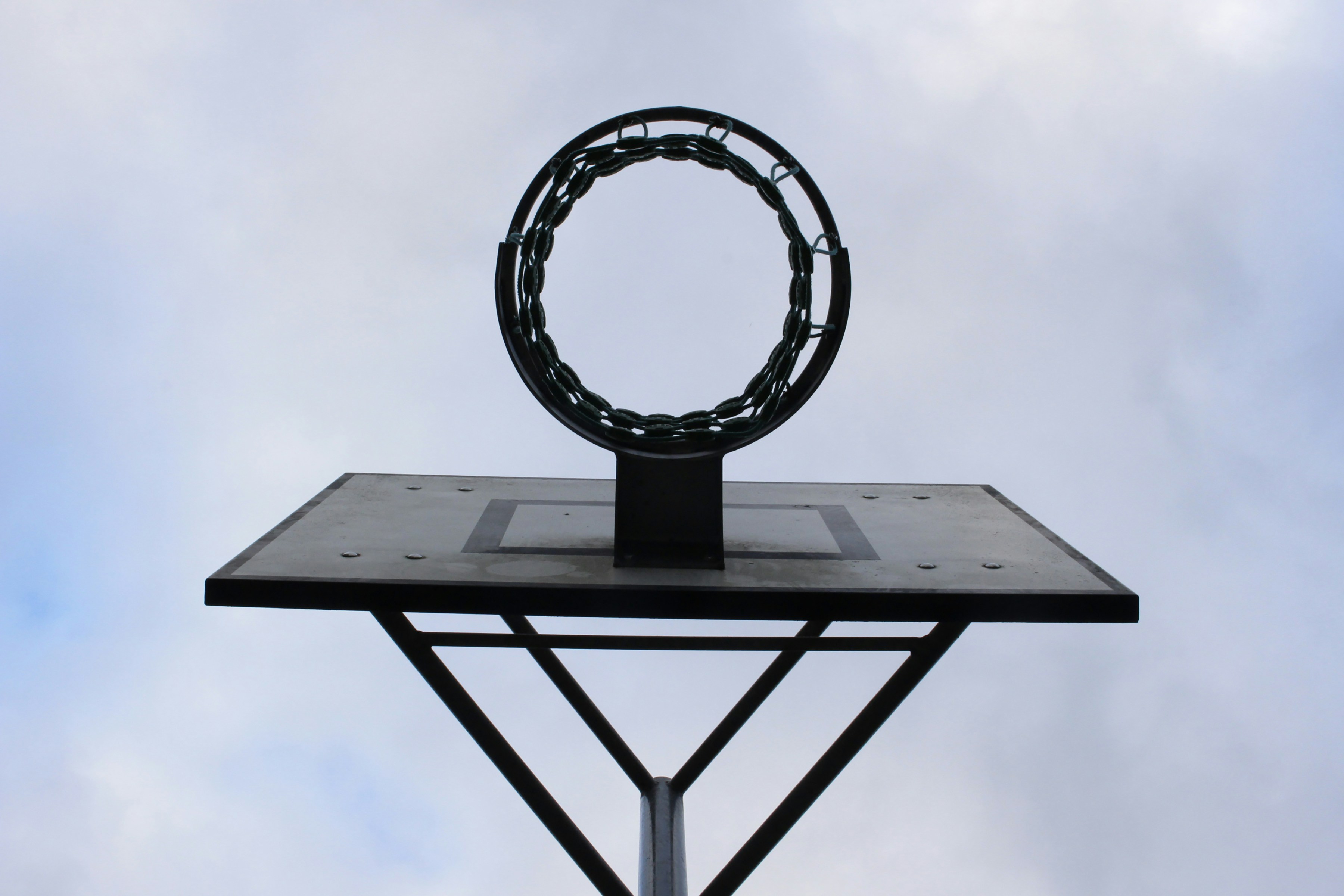 a metal object with a circular object on top of it