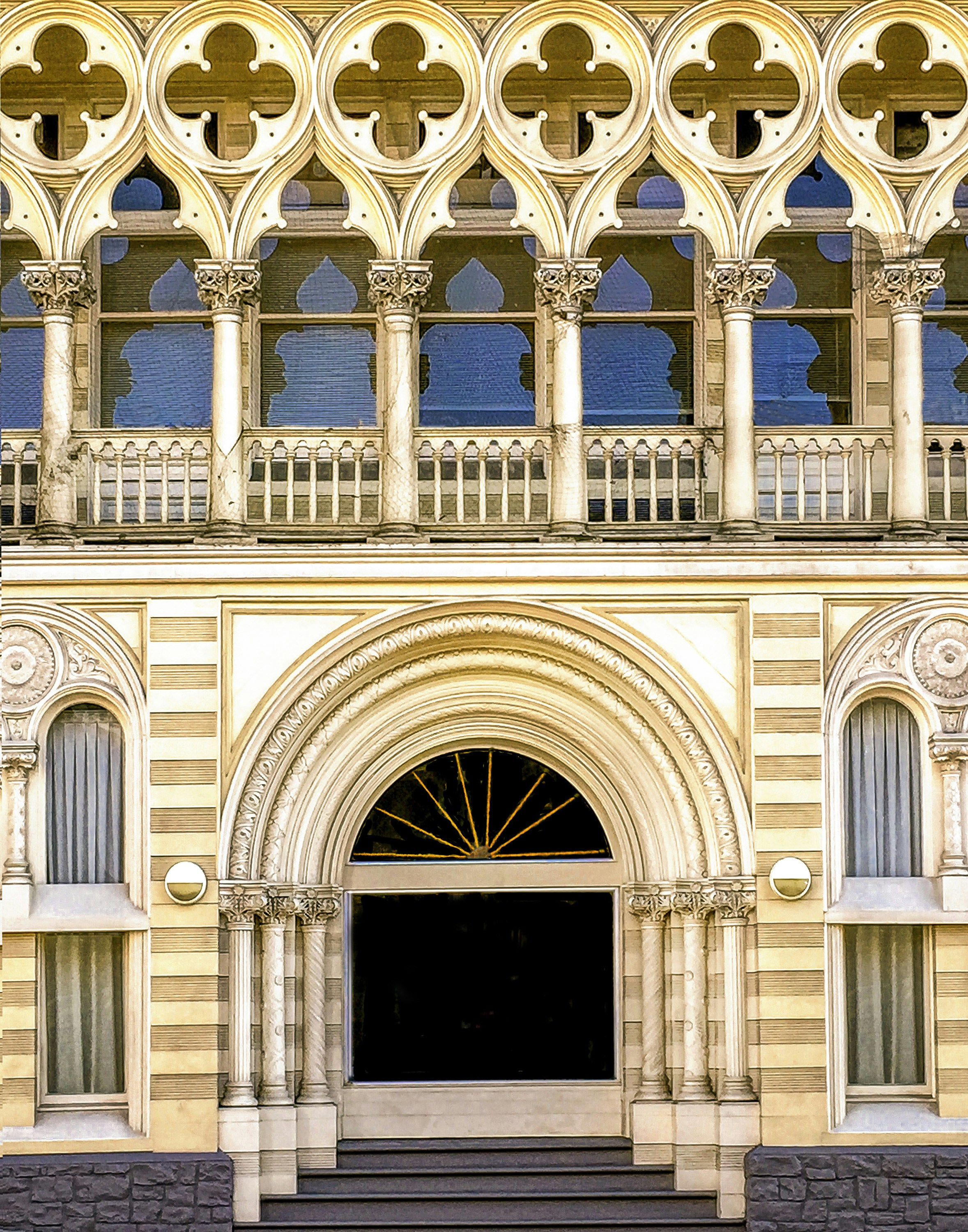 Central Arcaded Portal Framed by Quatrefoil Arches