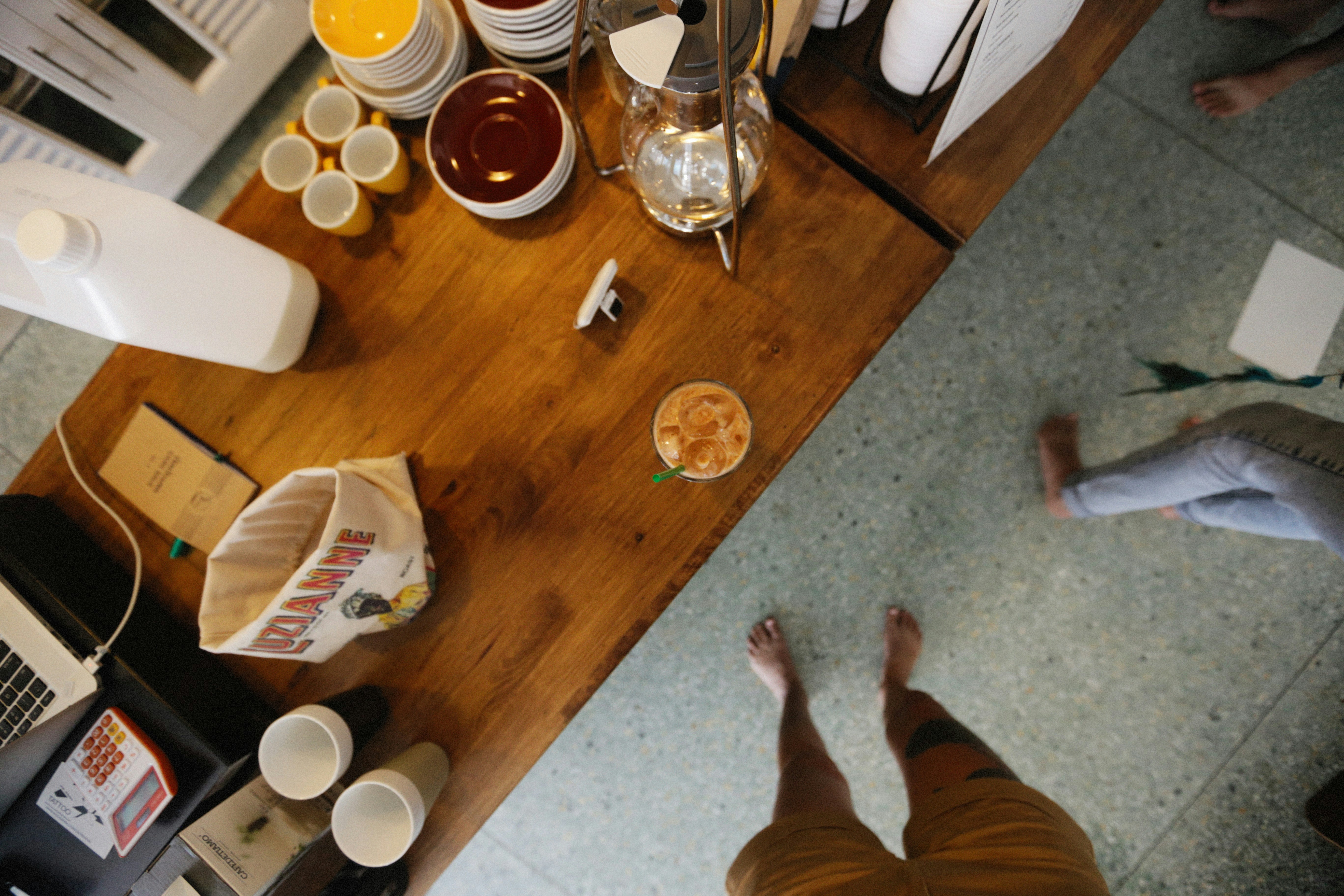 From Above the Bar: A Casual Café Scene with a Bird's-Eye Tilt