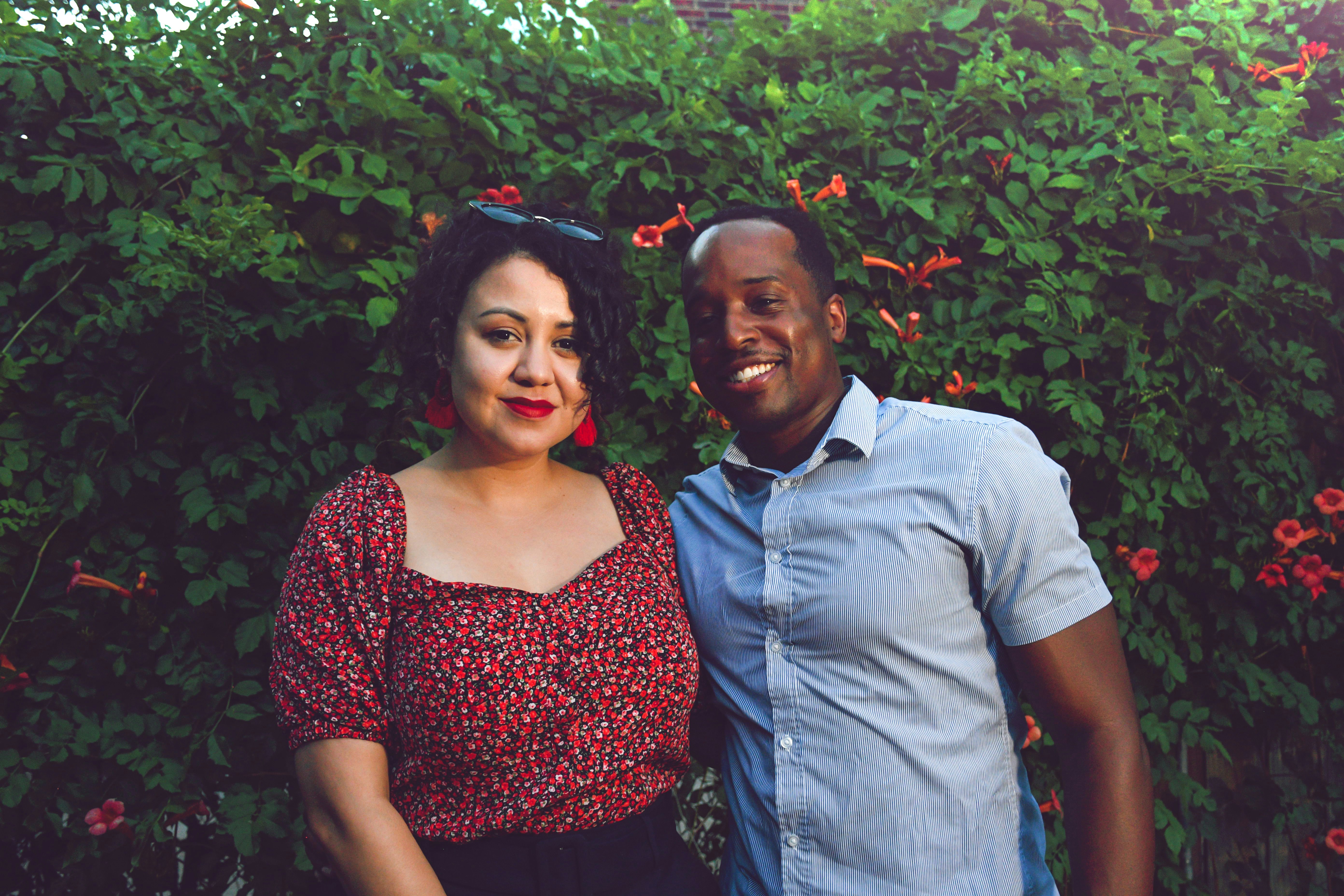 a man and a woman standing next to each other