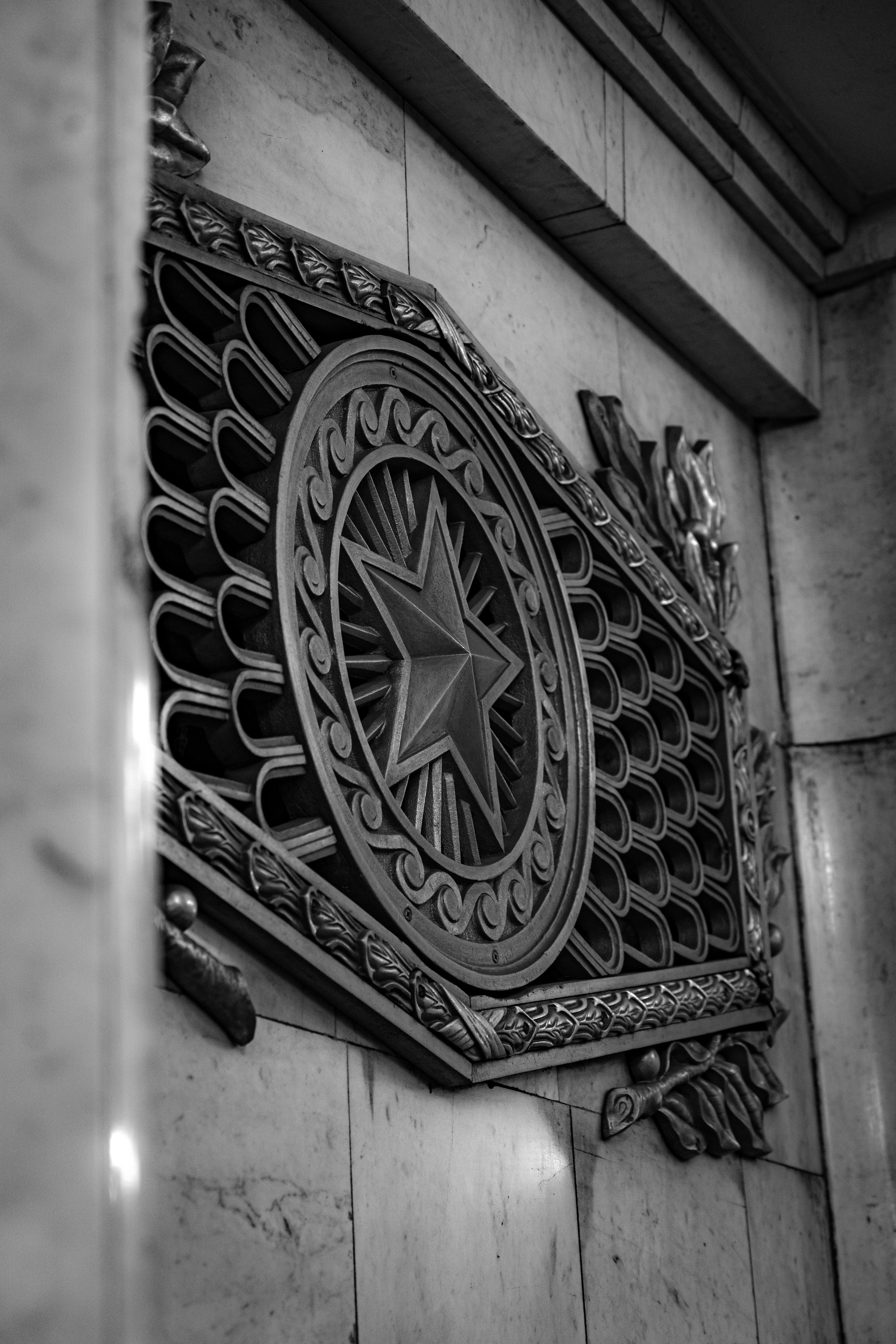Star Crest in Marble: An Ornate Metalwork Close-Up