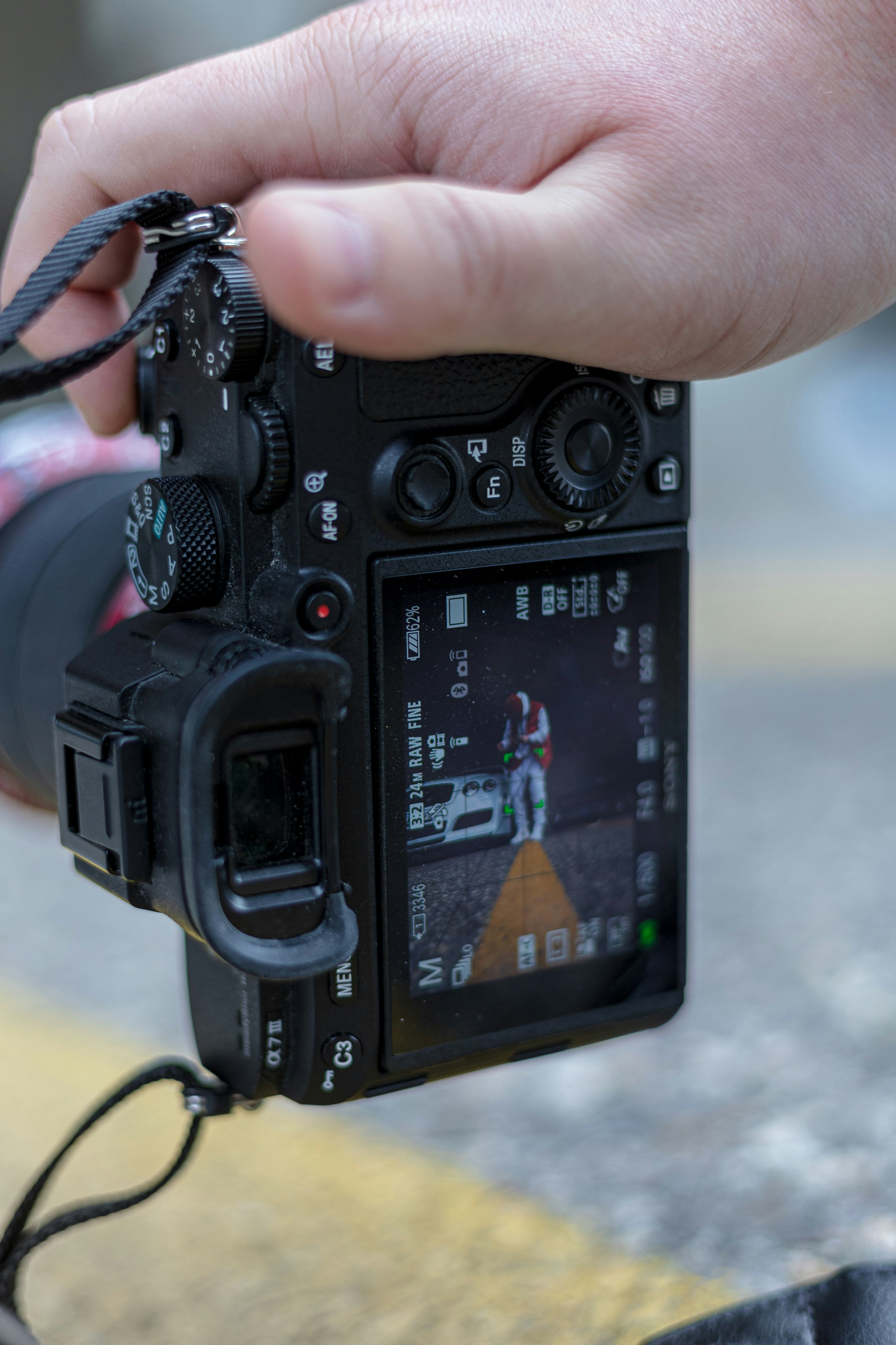 A person holding a camera in their hand photo – Free Switzerland Image ...